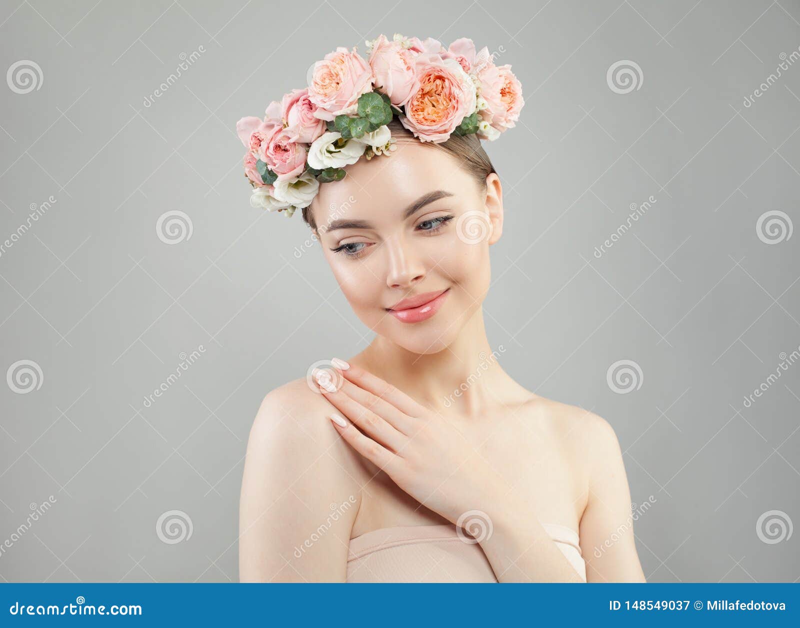 Beautiful Model with Clear Skin and Flowers on White Background Stock ...