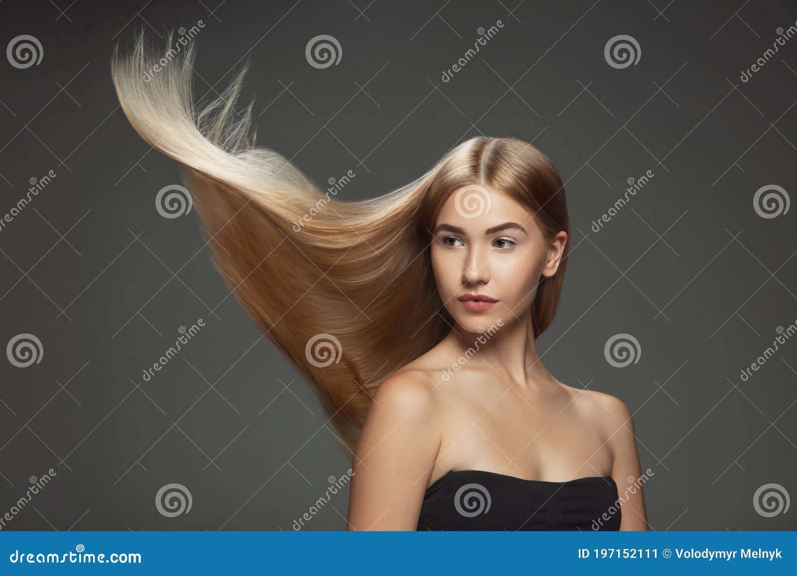Beautiful Model With Long Smooth Flying Blonde Hair Stock Image