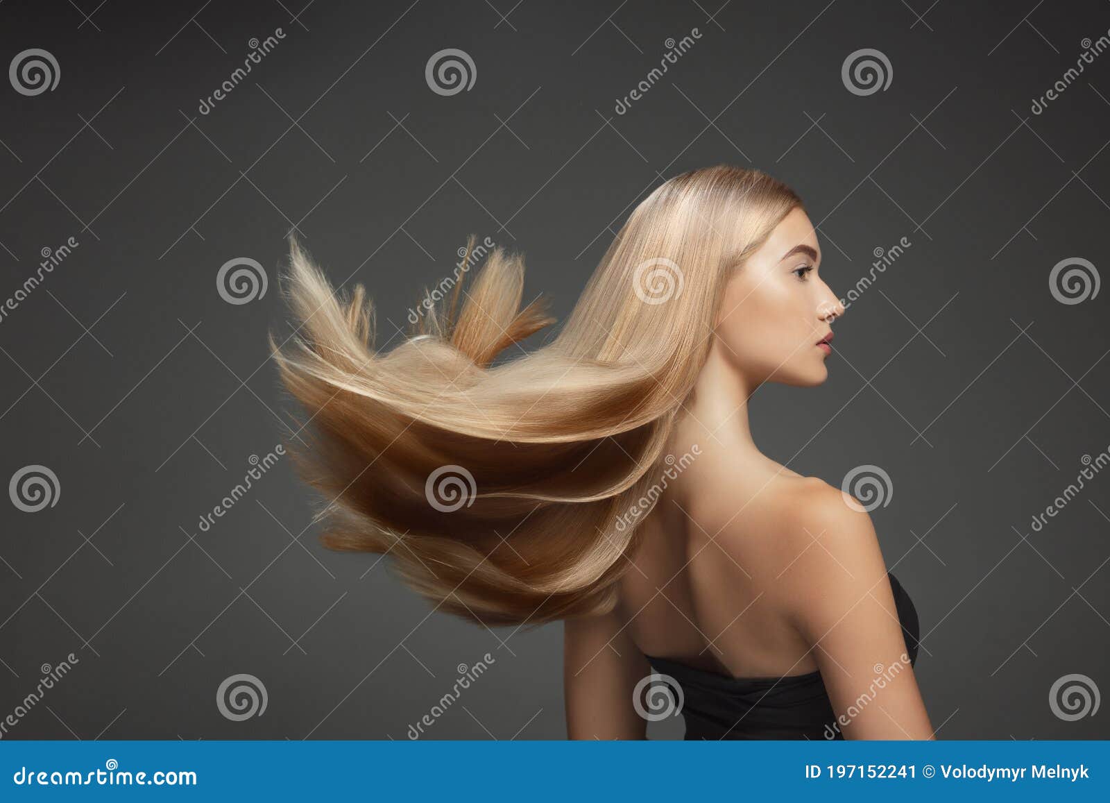 Beautiful Model With Long Smooth Flying Blonde Hair Stock Image