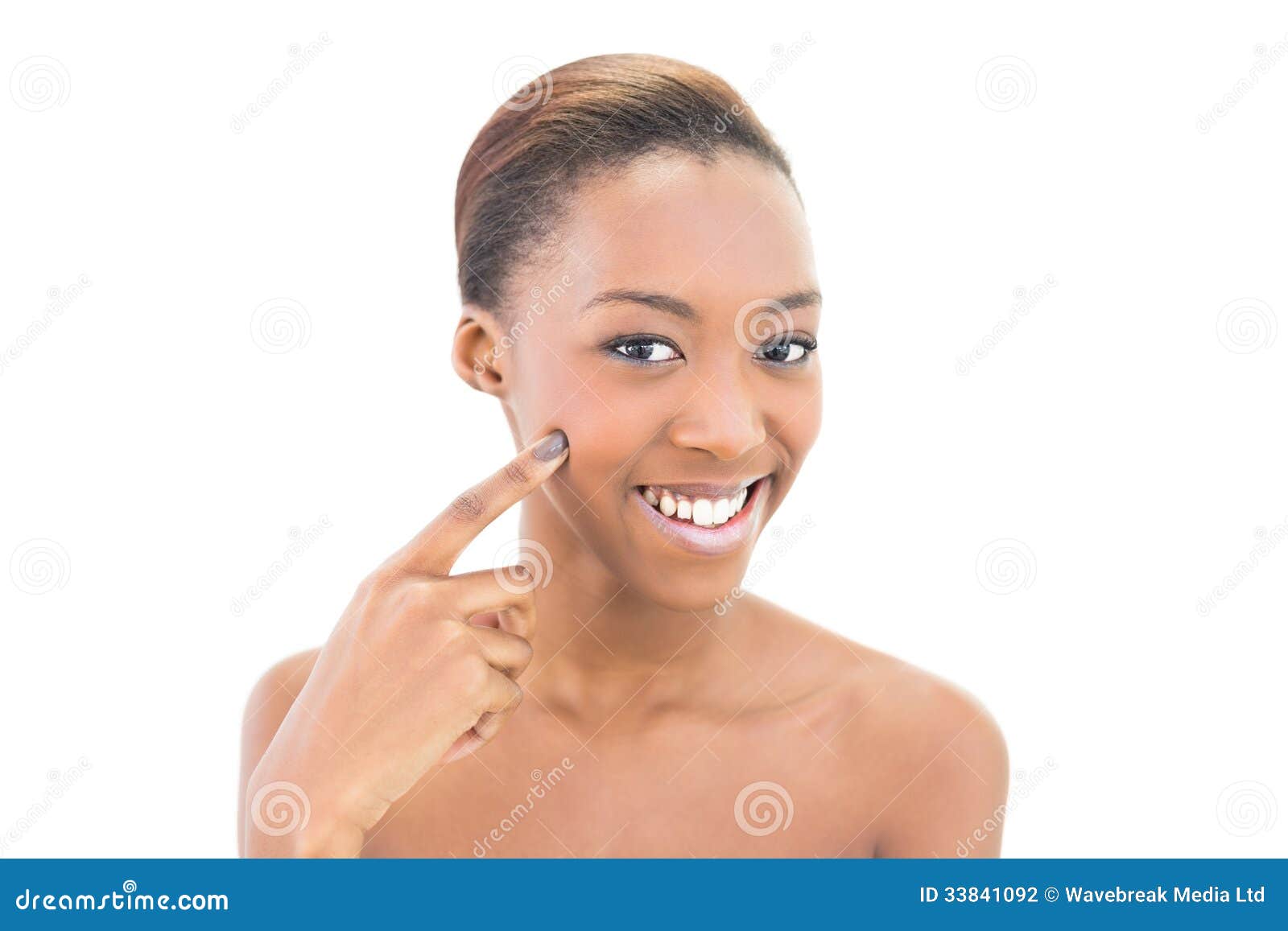 Beautiful Model Pointing To Her Cheek Stock Photo - Image of studio ...