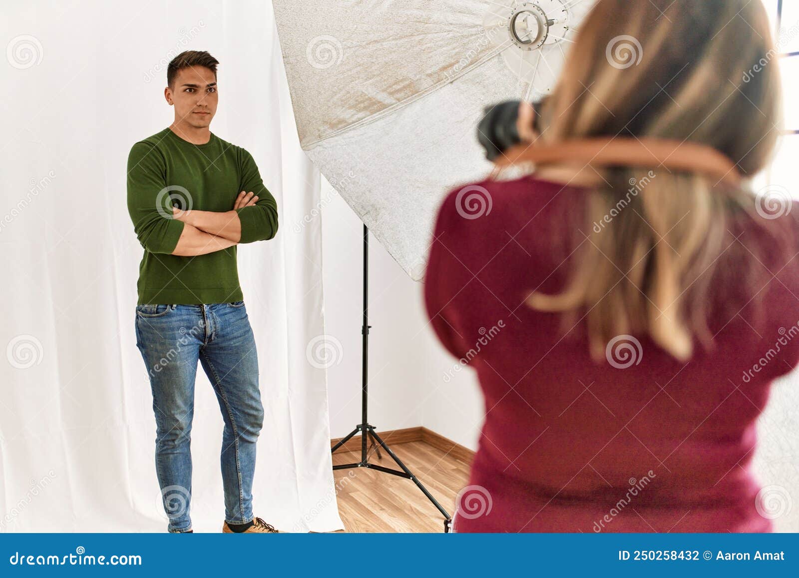 Beautiful Model Posing for Professional Photographer at Studio Stock ...