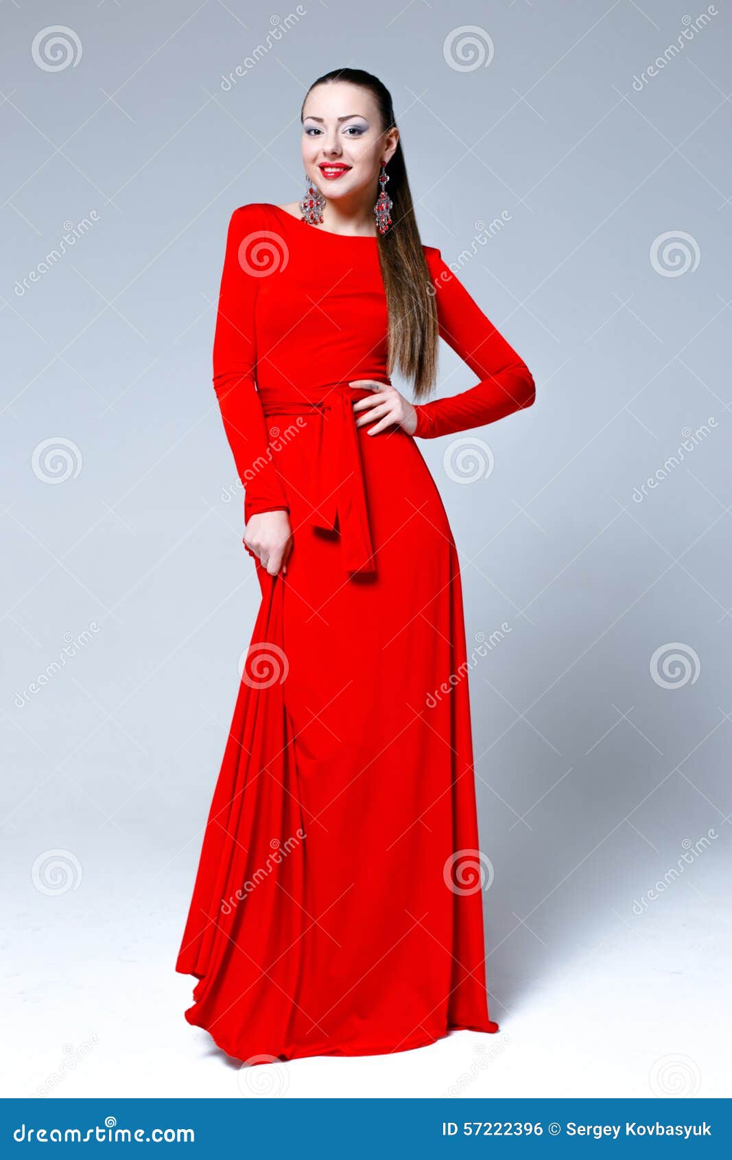Beautiful Model in Red Dress Stock Photo - Image of standing, gorgeous ...