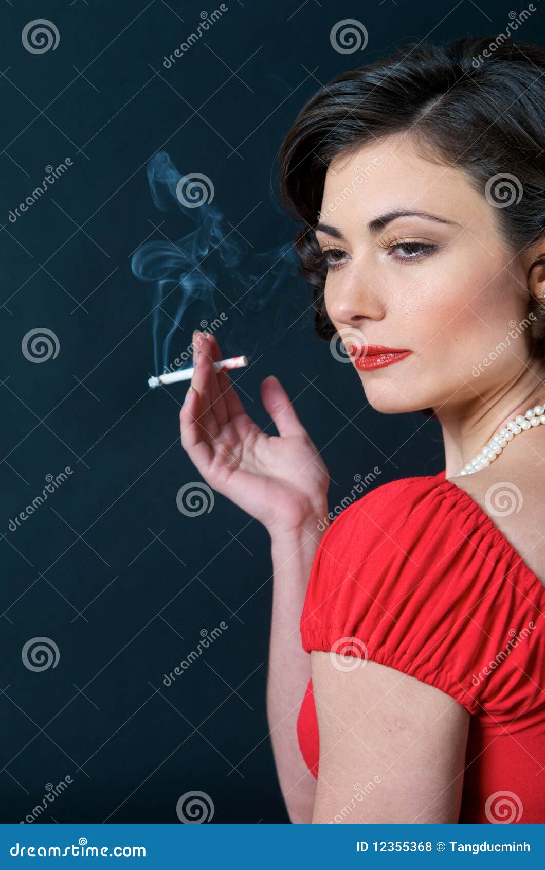 Beautiful Model in Red Smoking Stock Photo - Image of young, hair: 12355368