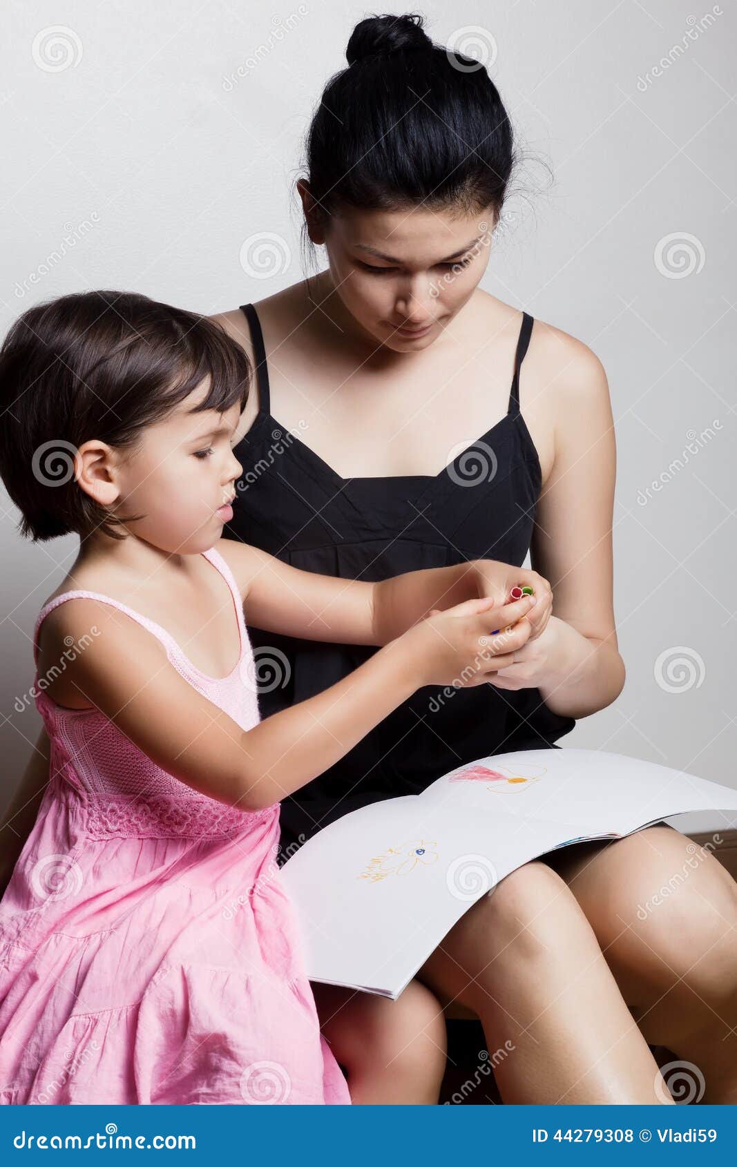 Beautiful Mom Helping Her Daughter Drawing Stock Photo - Image of child ...