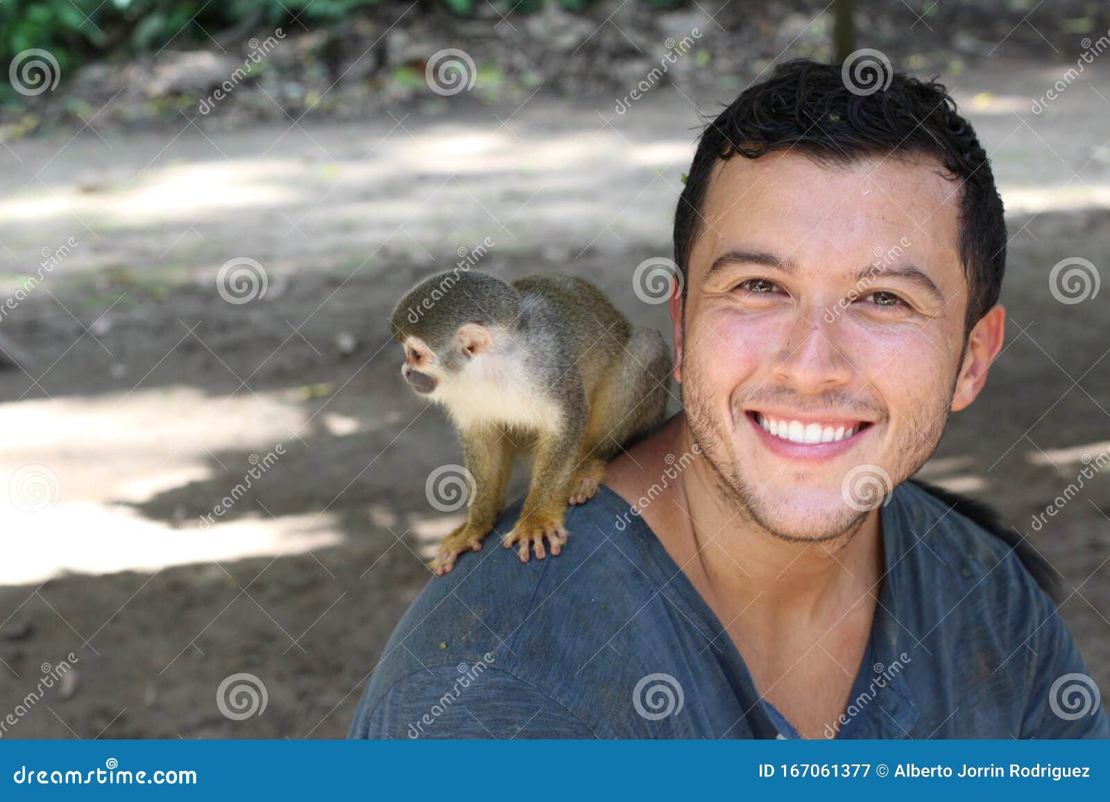 Beautiful Monkey Interacting with a Huma Stock Image - Image of ...