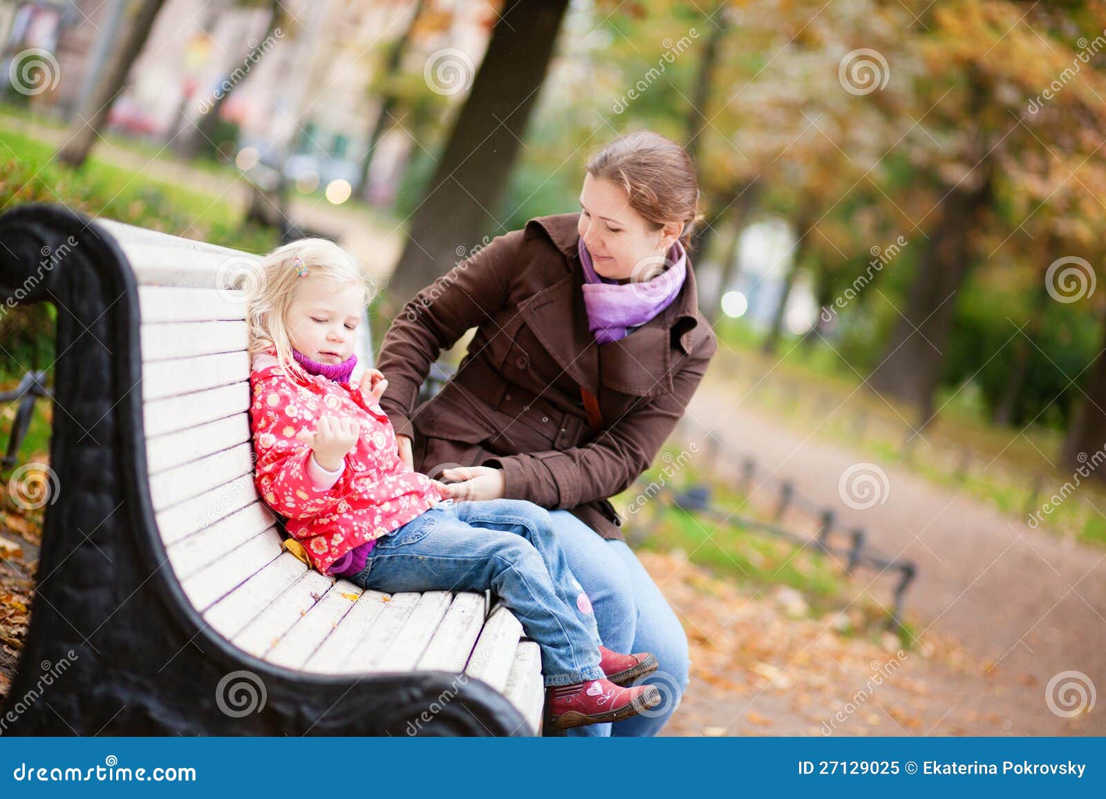 Beautiful Mother and Daughter Sitting on a Bench Stock Image - Image of ...