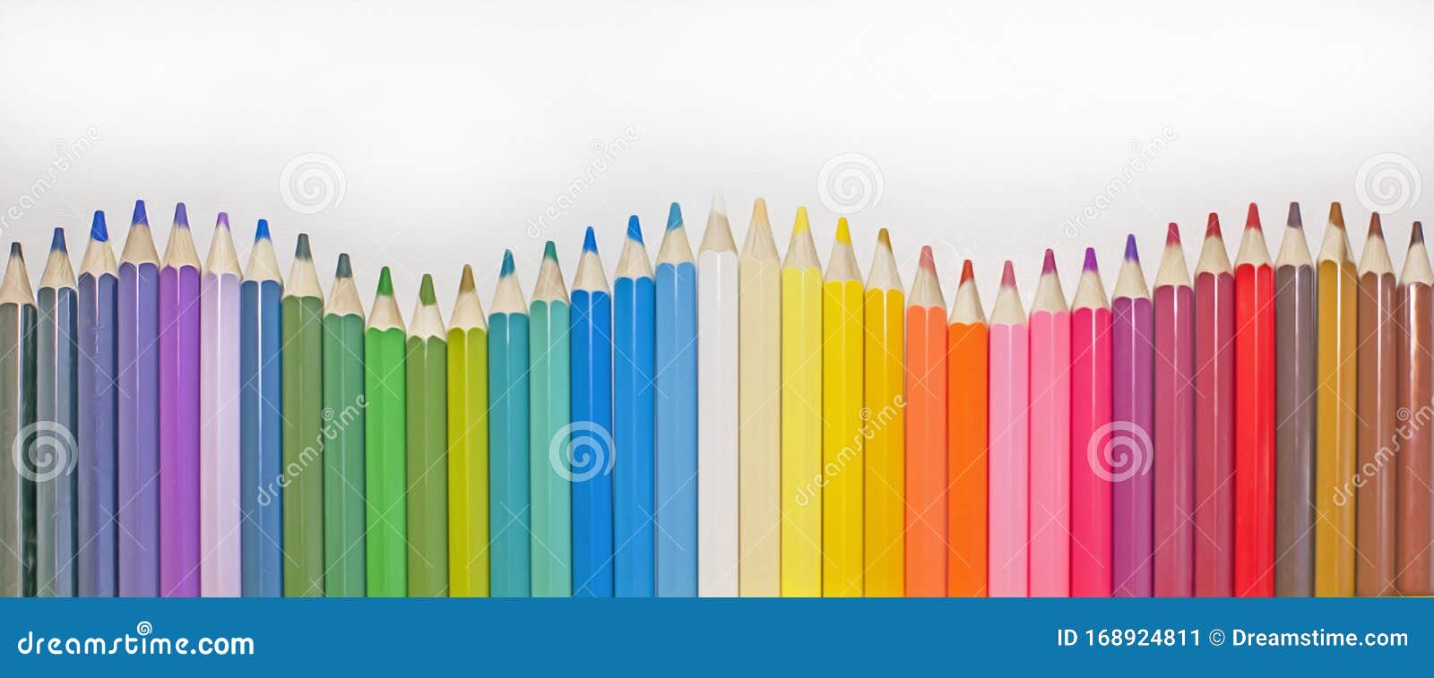 Beautiful Multi-colored Pencils Lined Up in a Row, Blurred Background ...
