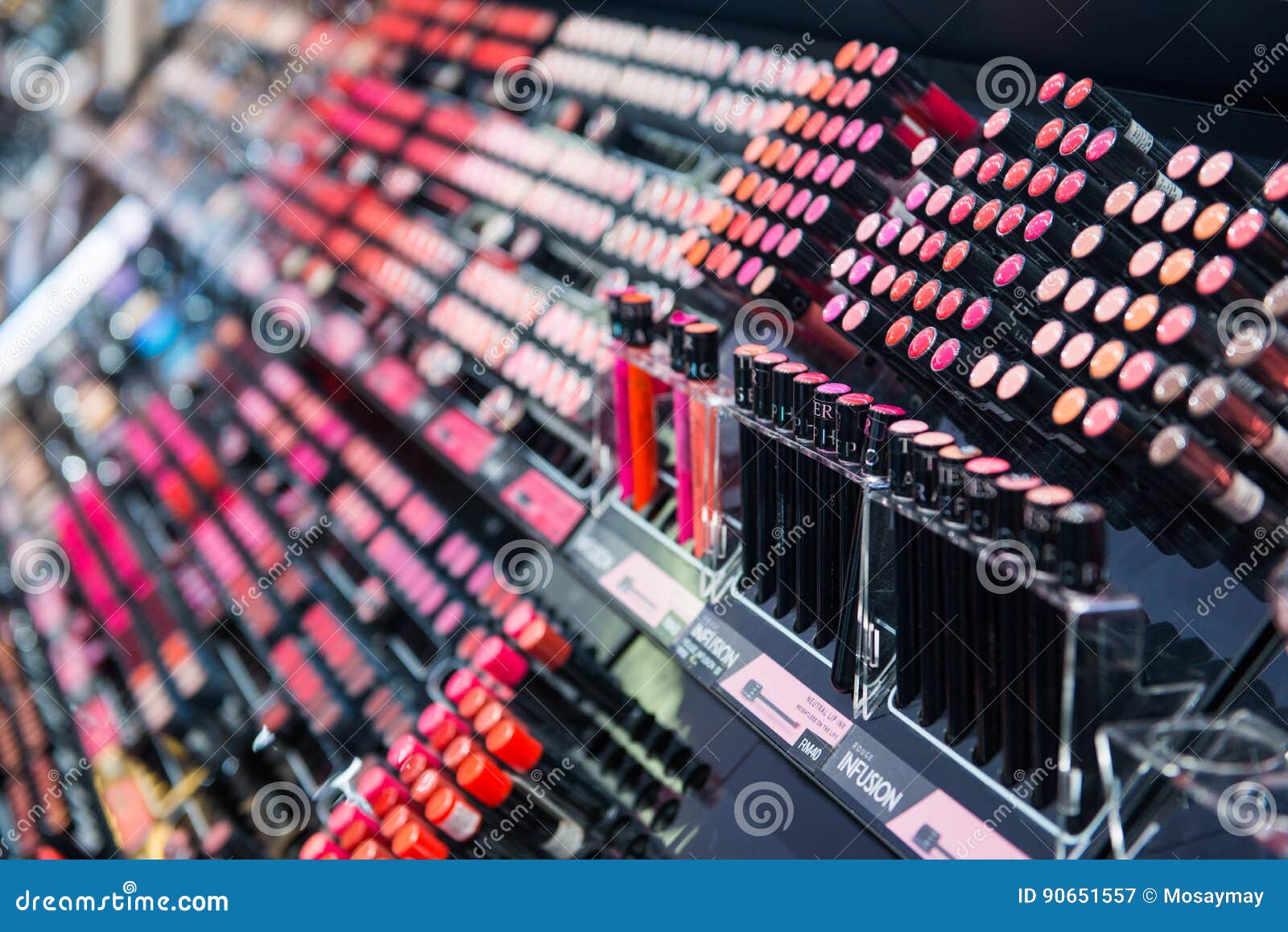 Beautiful Multi Colorful Lipsticks on Cosmetics Counter Editorial ...