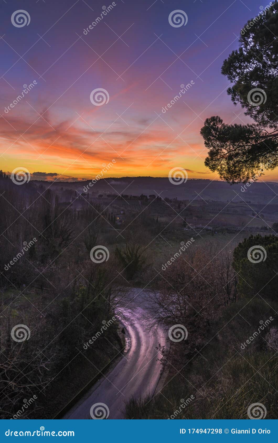 Beautiful Multicolor Sunset Over Country Road Stock Photo - Image of ...
