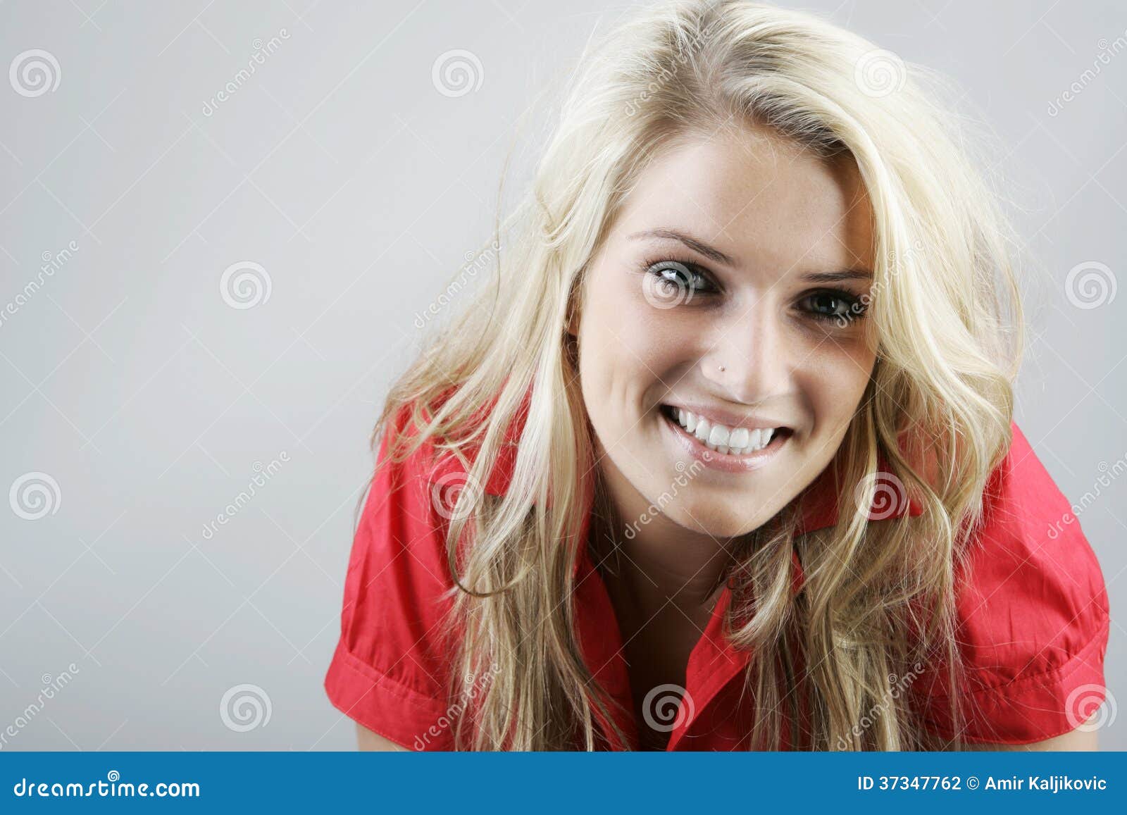 Beautiful Natural Smiling Blond Woman Stock Photo - Image of grey, grin ...