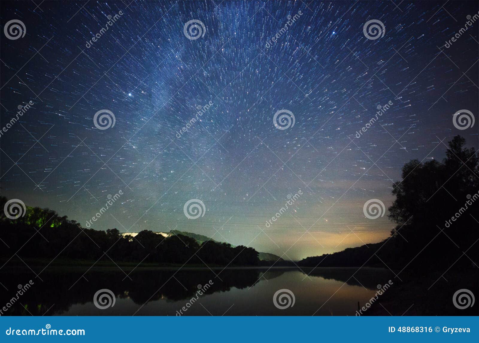 Beautiful Night Sky, the Milky Way, Star Trails and the Trees Stock ...