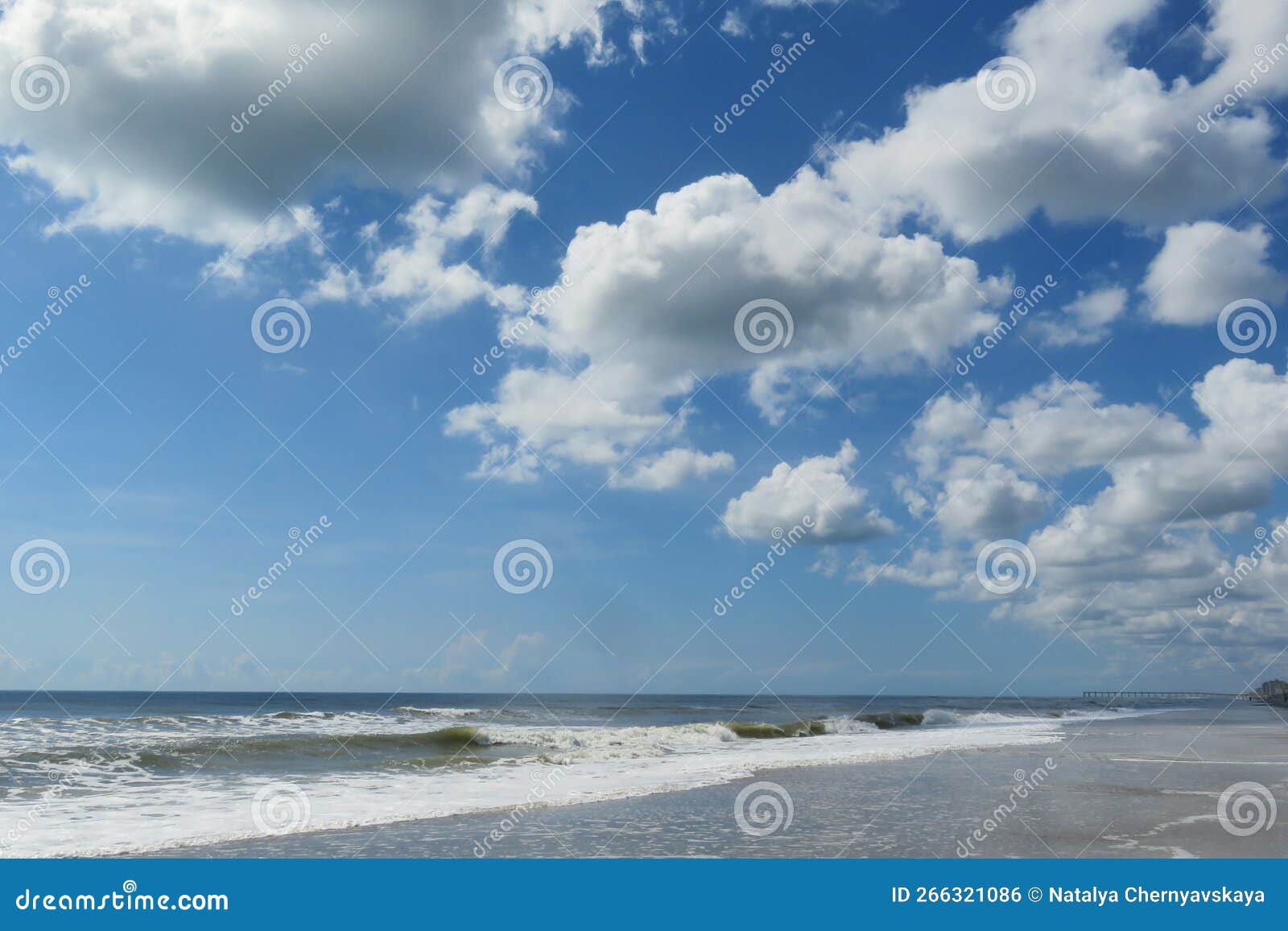 Blue Sky with Fluffy Clouds at the Beach Stock Photo - Image of ...