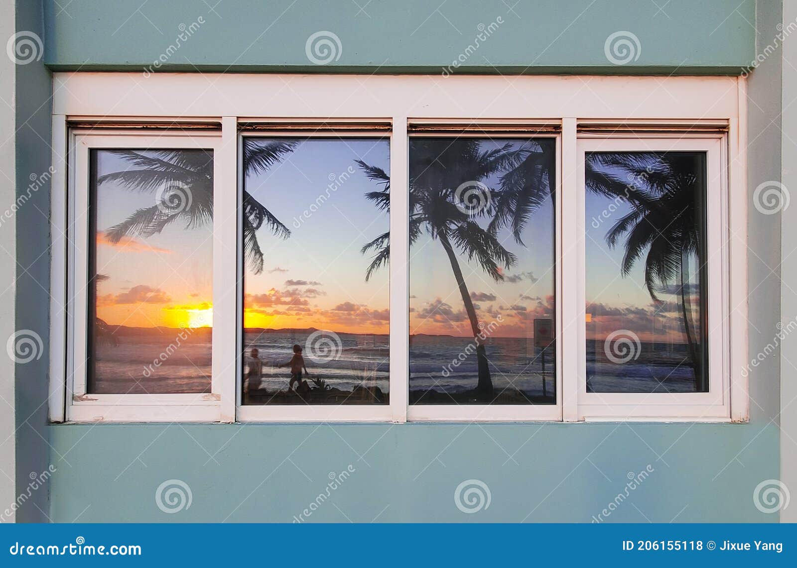 Beautiful Ocean Sunrise Reflected on Windows Stock Photo - Image of ...