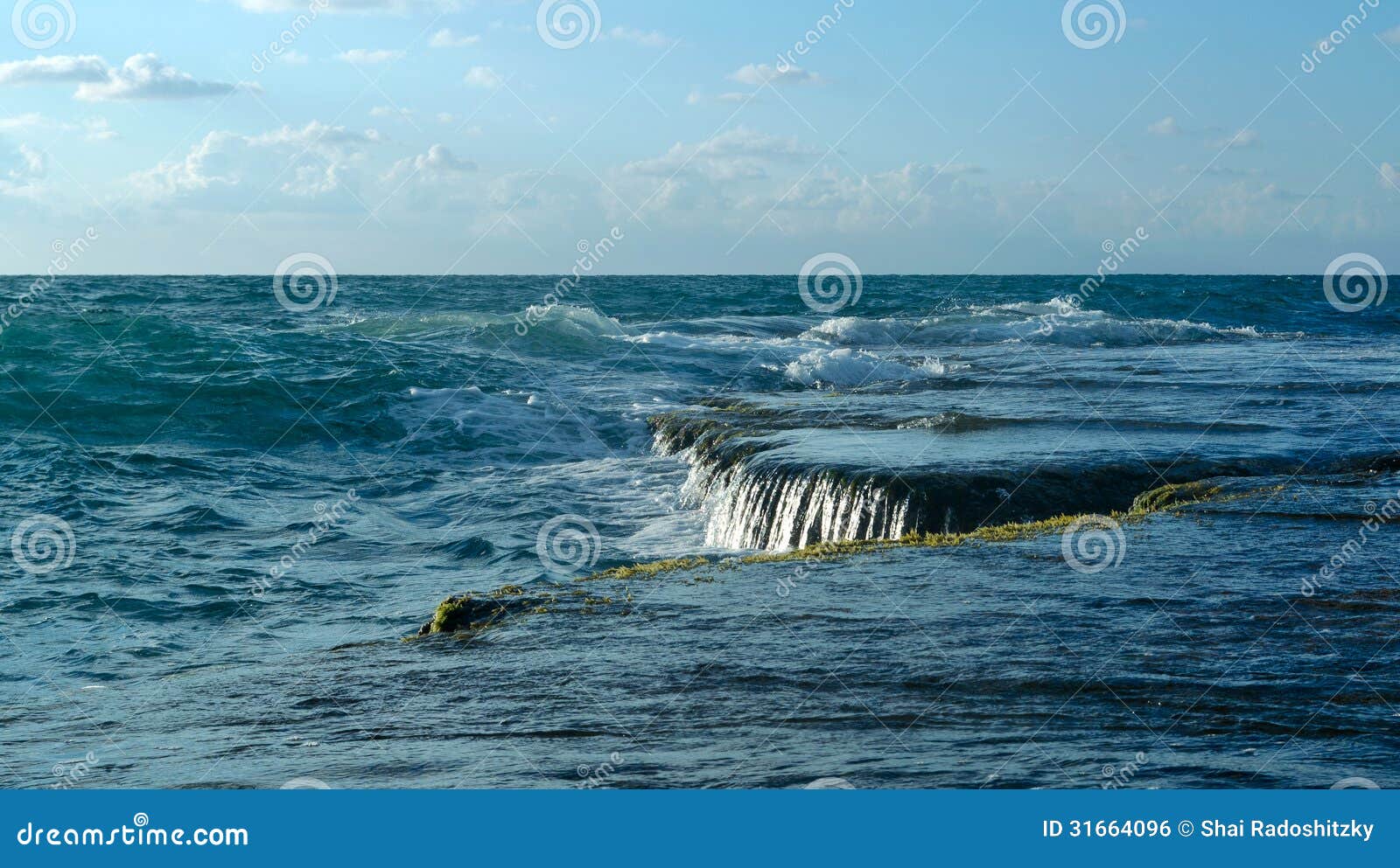 Beautiful ocean waterfall stock photo. Image of waterfall - 31664096