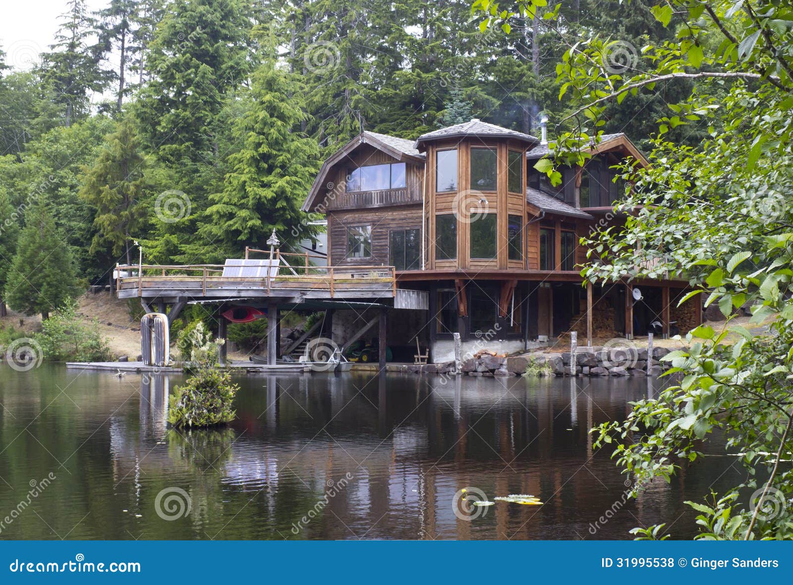 Beautiful Off Grid Home on Pond Stock Photo - Image of energy, outside ...