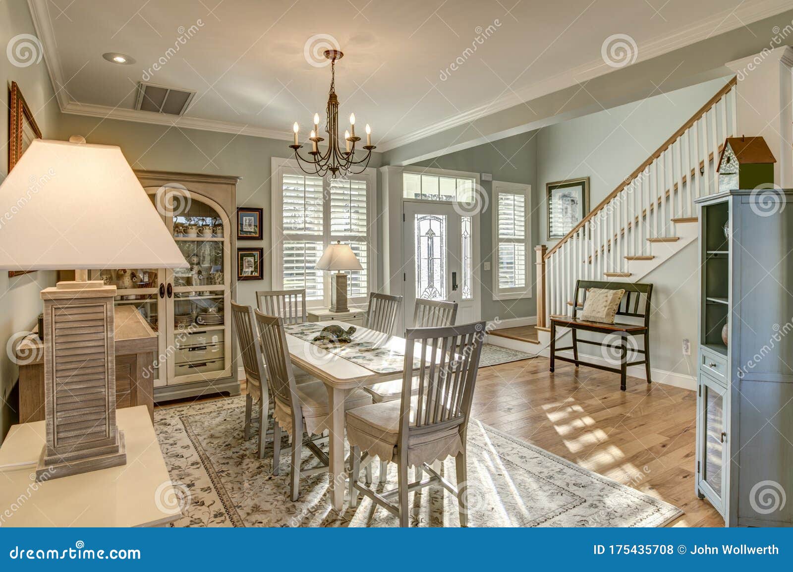 Beautiful Open Diningroom with Light Coming through Door and Windows ...