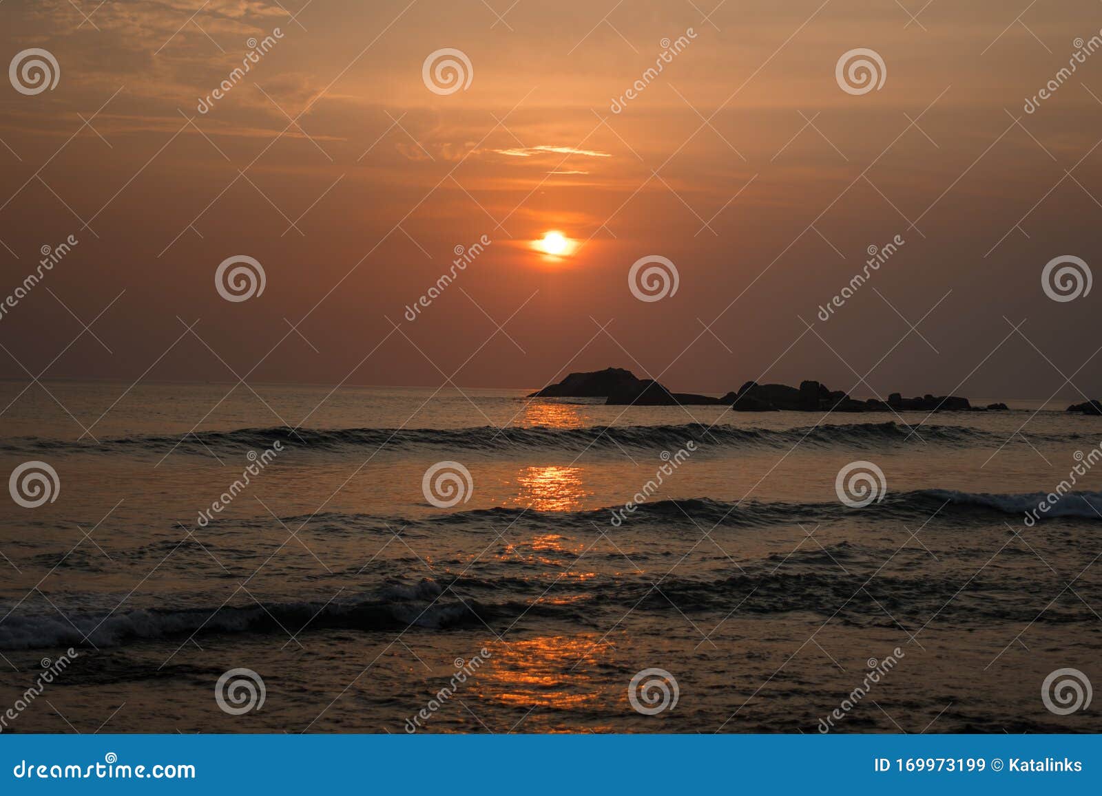 Beautiful Orange Sun at Sunset and a Path of Light on the Waters of the ...