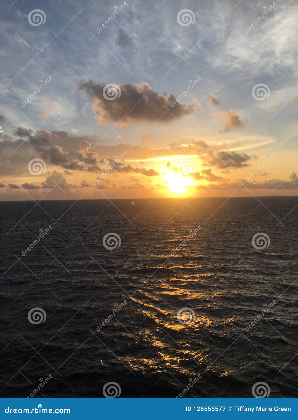 The Sunset Over the Open Ocean Stock Image - Image of open, clous ...