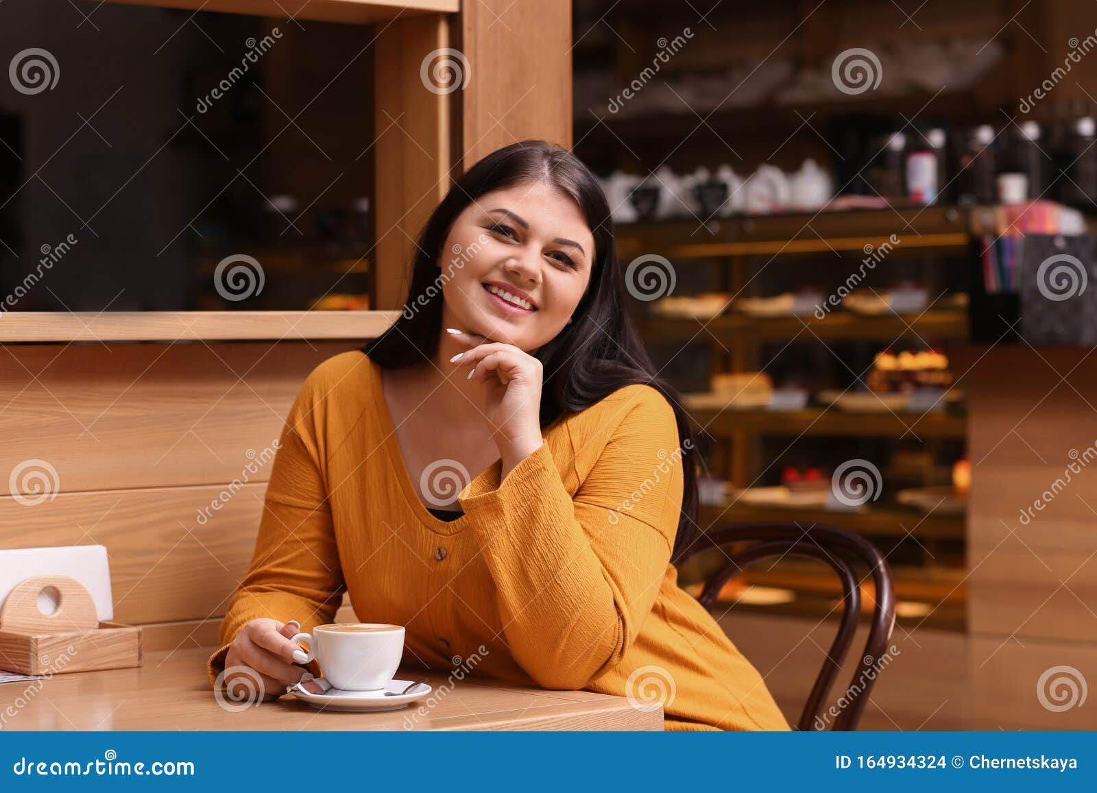 Beautiful Overweight Woman at Table in Cafe Stock Photo - Image of ...