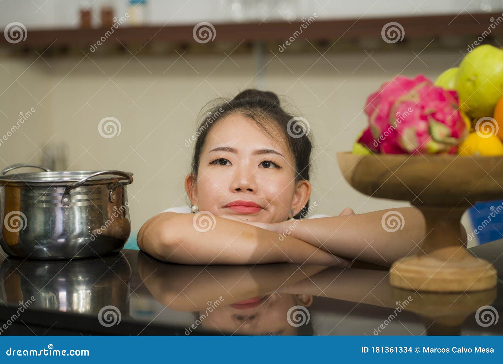 Beautiful Overwhelmed And Stressed Korean Girl Working In Kitchen