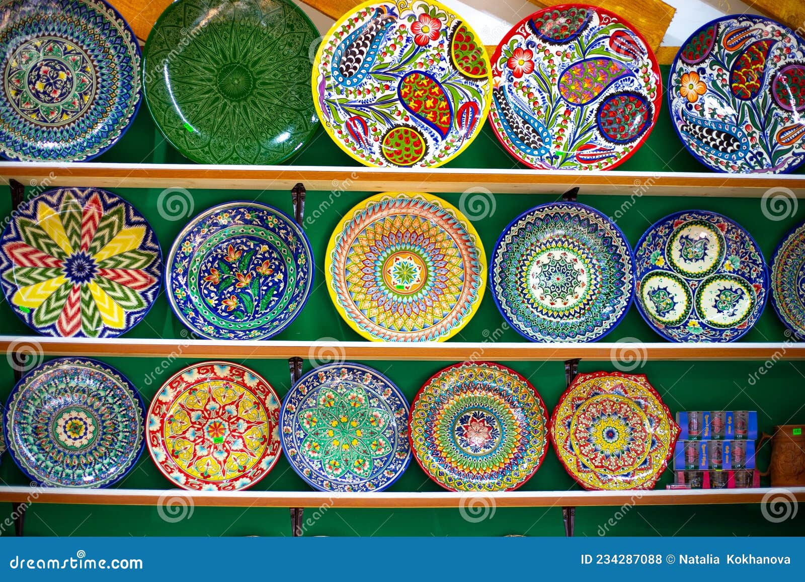 Beautiful Painted Ceramic Tableware on the Rack. Creativity of the ...