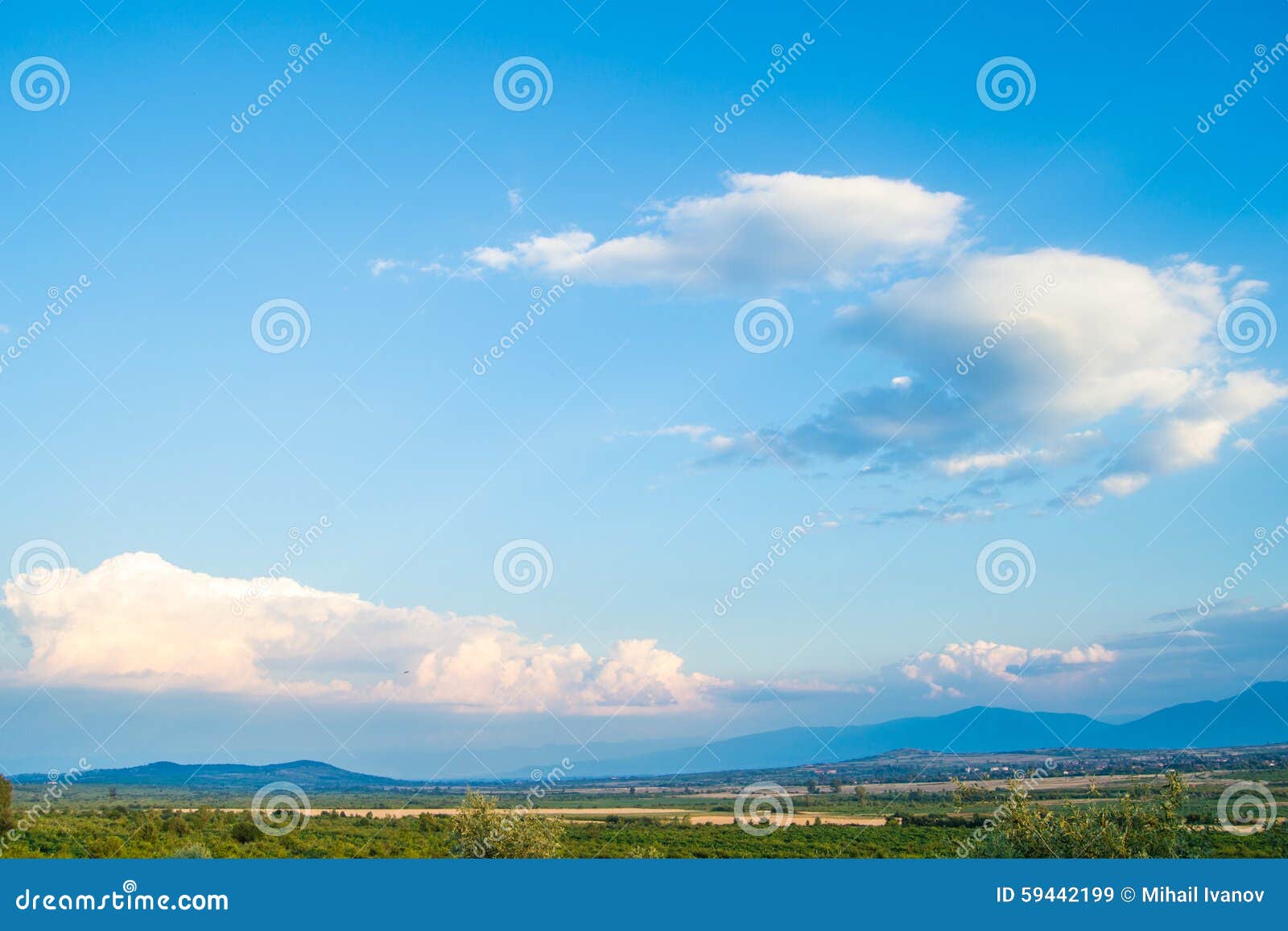 Beautiful Panoramic View of Green Mountains and Blue Sky with White ...