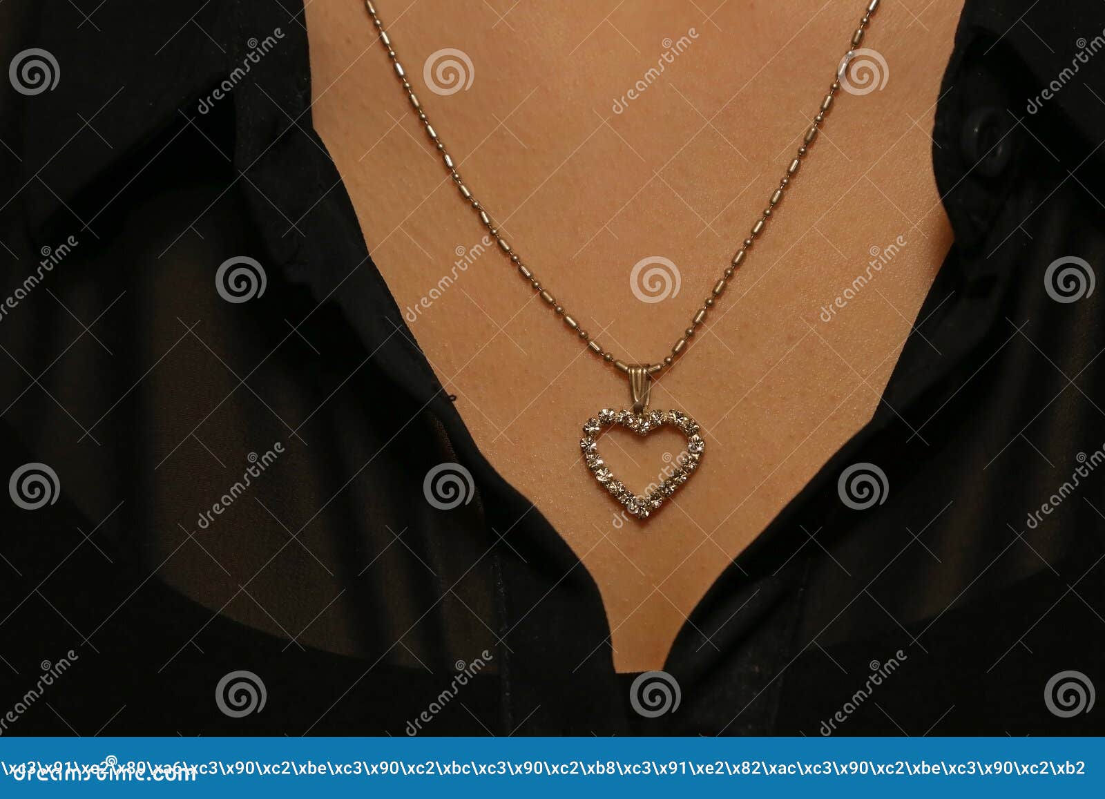 A Beautiful Pendant Around the Neck of the Girl. Stock Photo - Image of ...