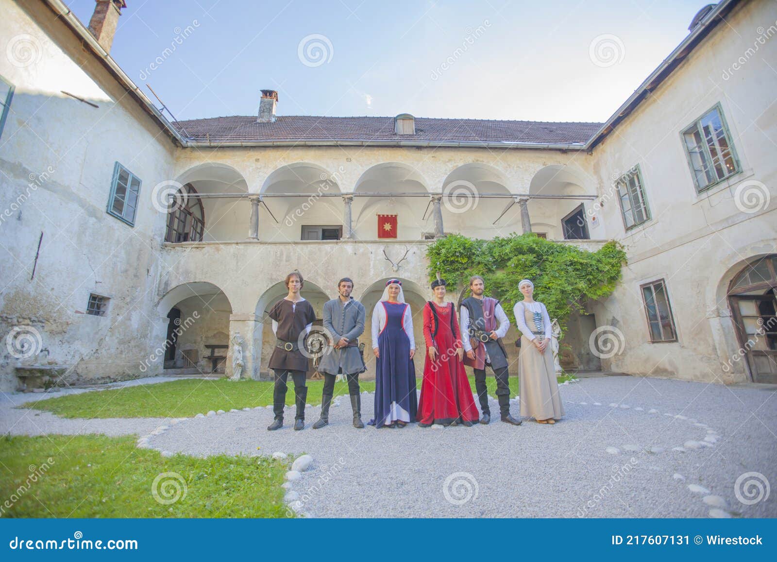 People in Medieval Clothes Pose in Front of Castle Editorial Photo ...
