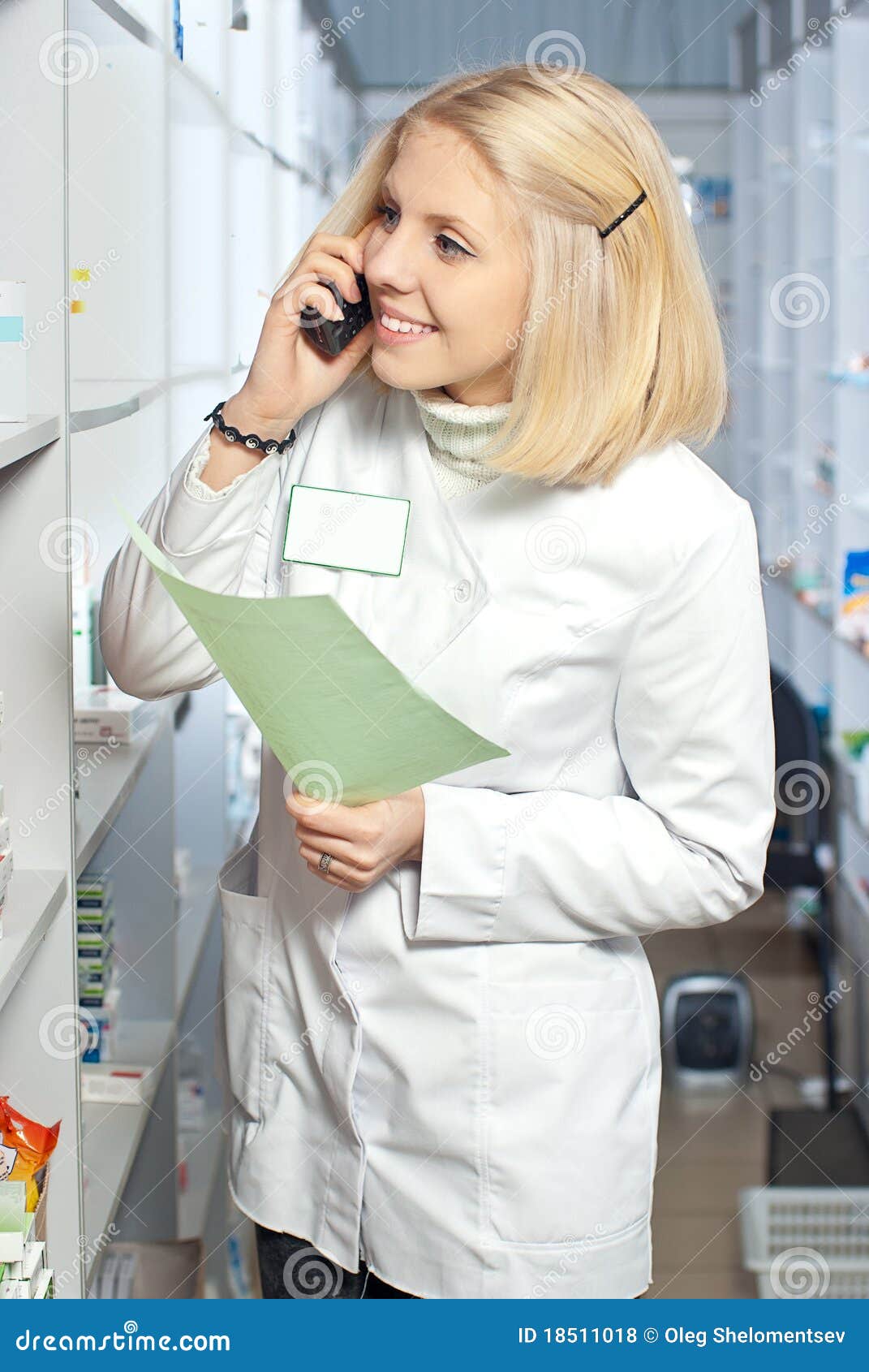 Beautiful pharmacist. stock photo. Image of drugstore - 18511018