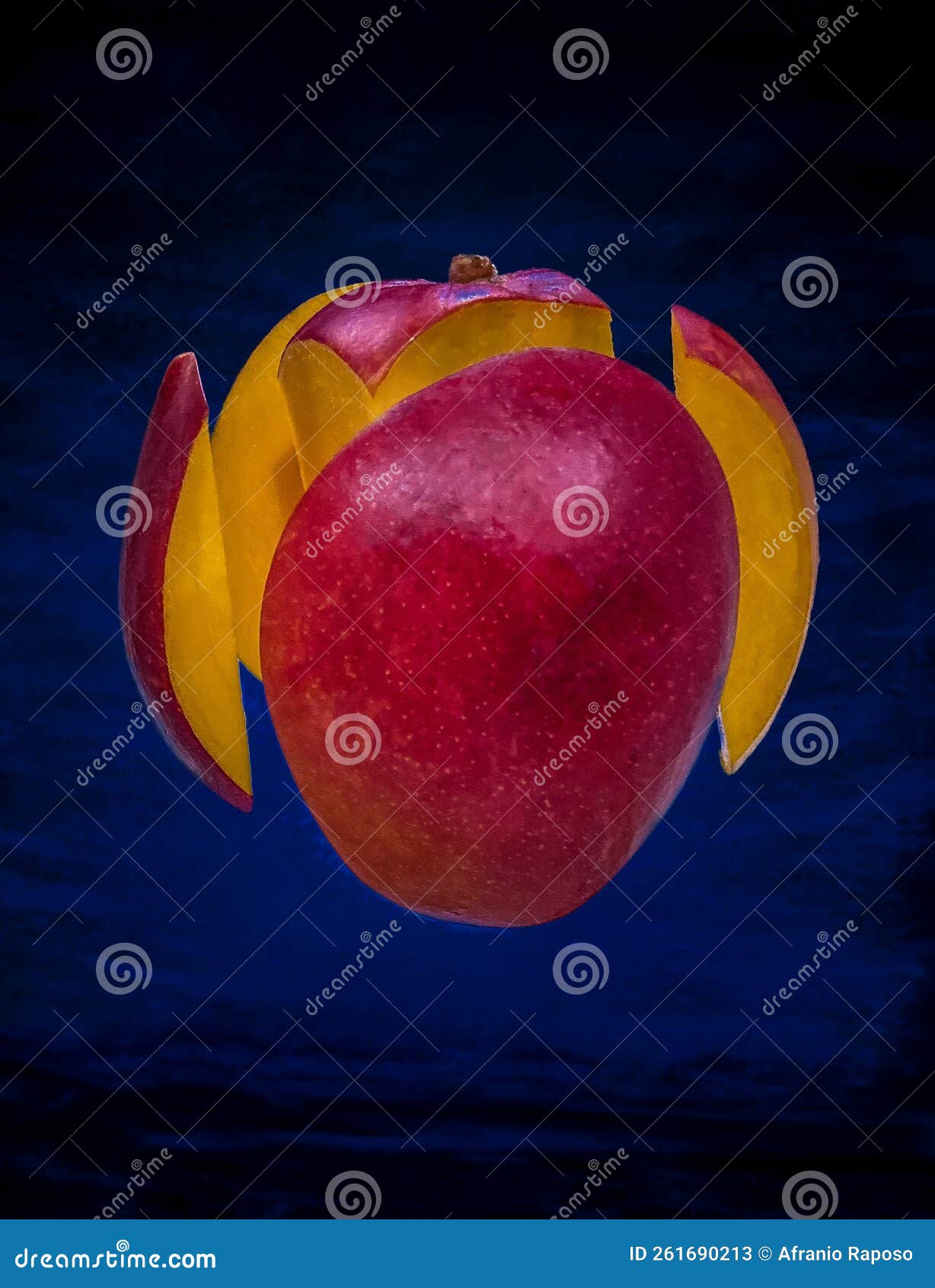Mango in blue background stock image. Image of nice - 261690213
