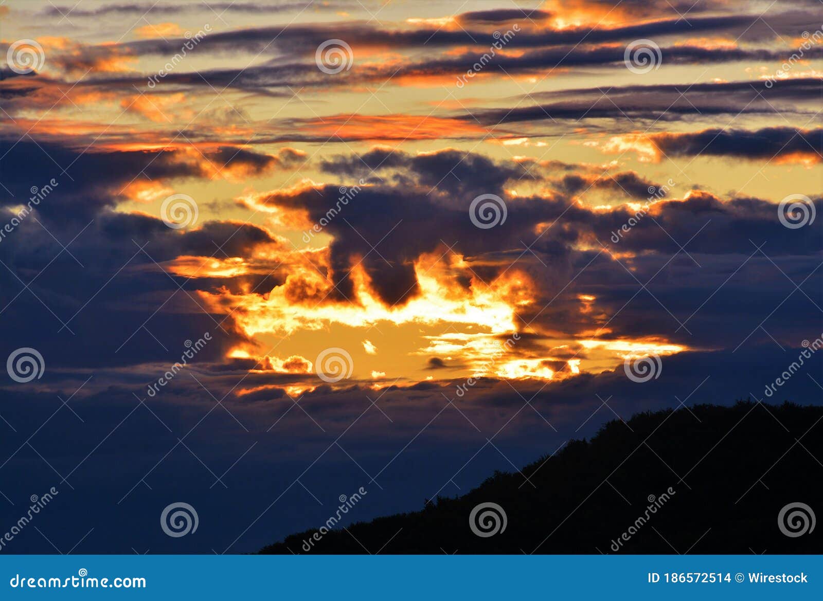 Beautiful Picture of a Mesmerizing Sunset Over the Mountains Stock ...