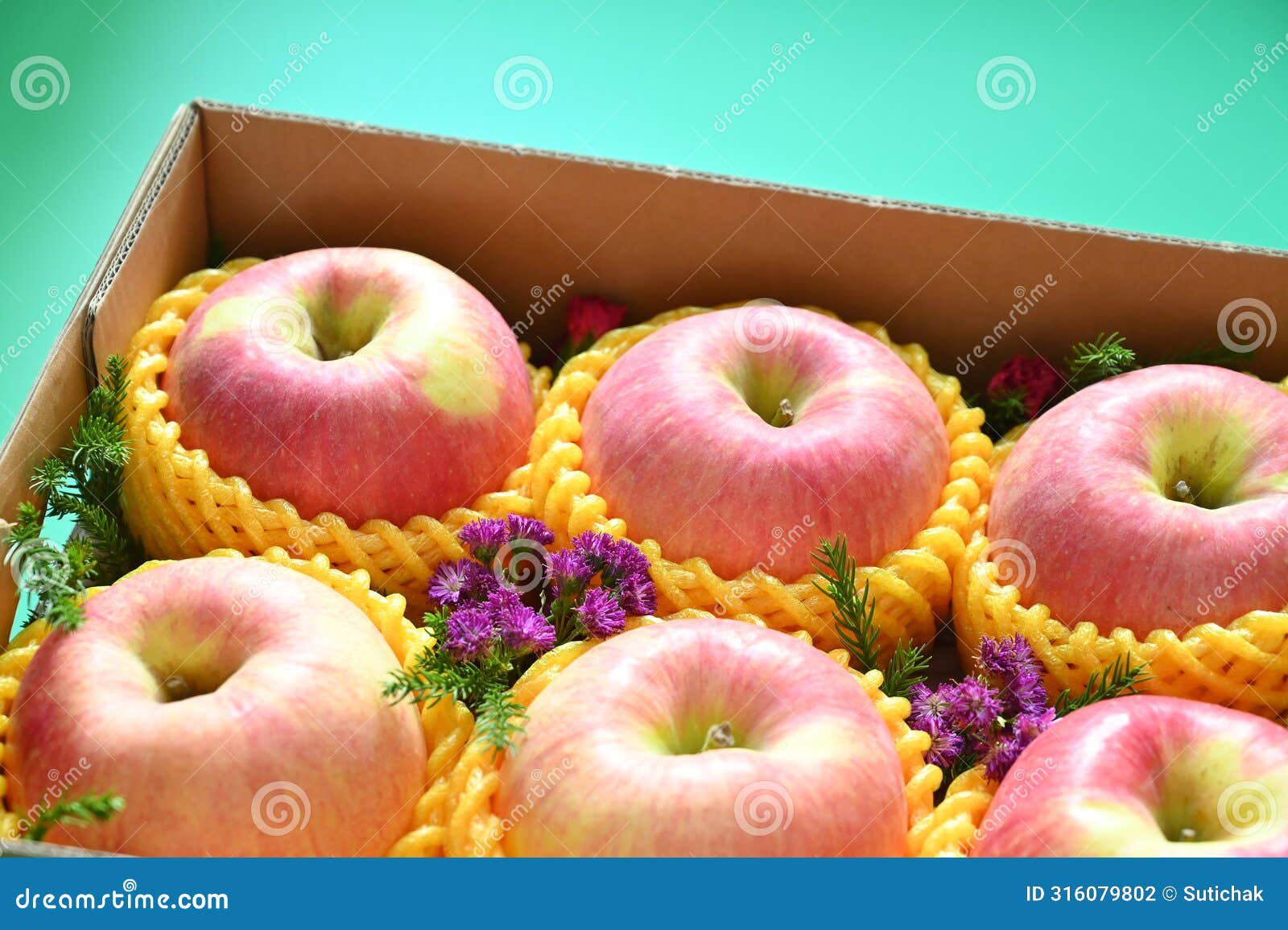 Beautiful Pink Apple in the Box on Green Background Stock Photo - Image ...