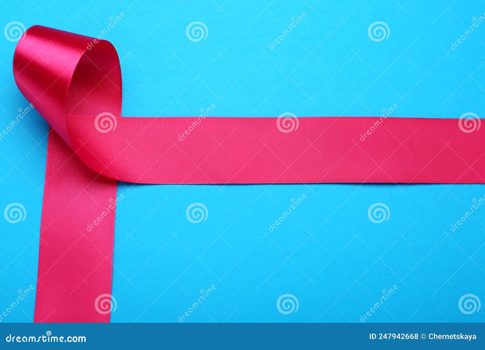 Beautiful Pink Ribbon on Light Blue Background, Top View Stock Photo ...