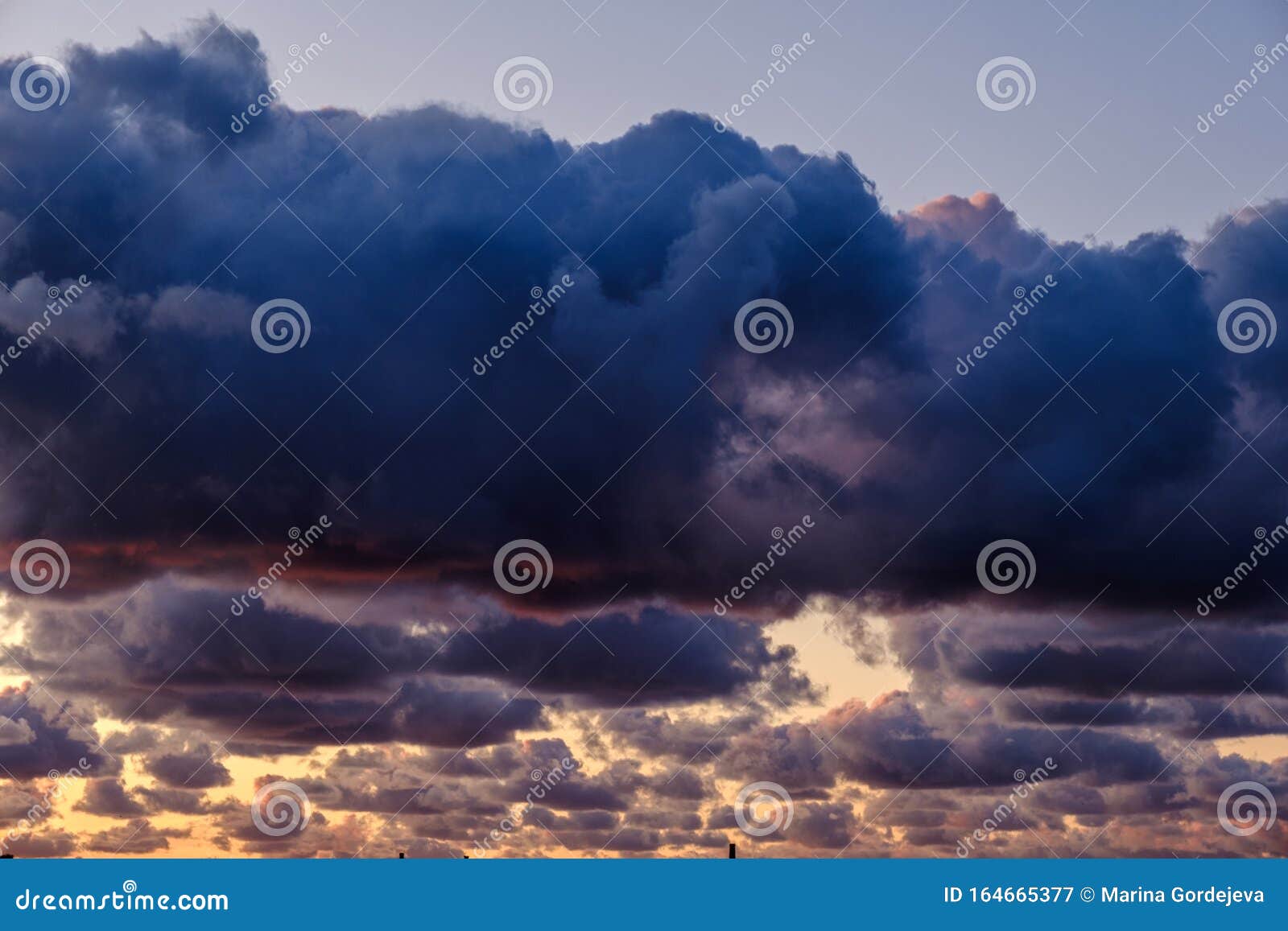 Beautiful Pink Sunset on the Blue Sky with Dark Clouds. Dramatic Sky ...