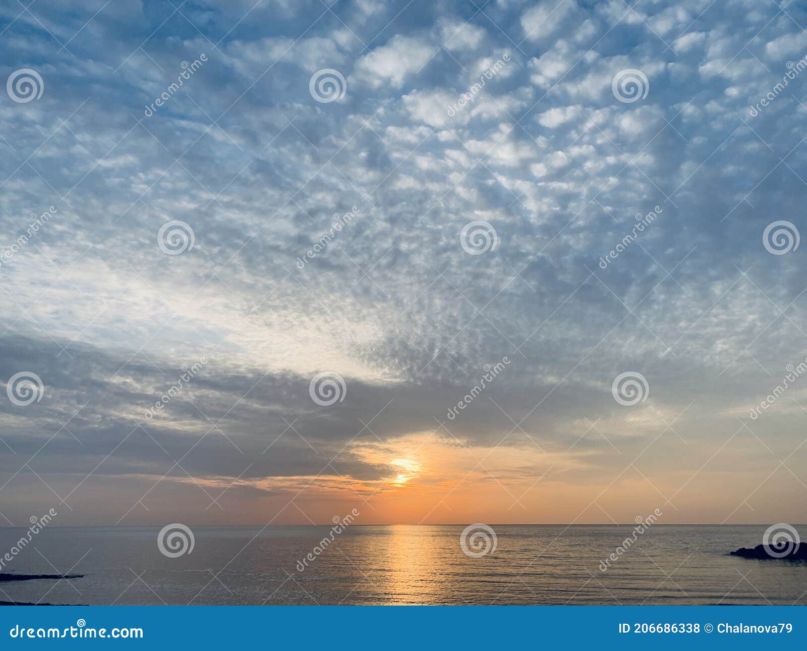 Beautiful Pink Orange Sunset with Sun Rays Over Sea. Stock Photo ...