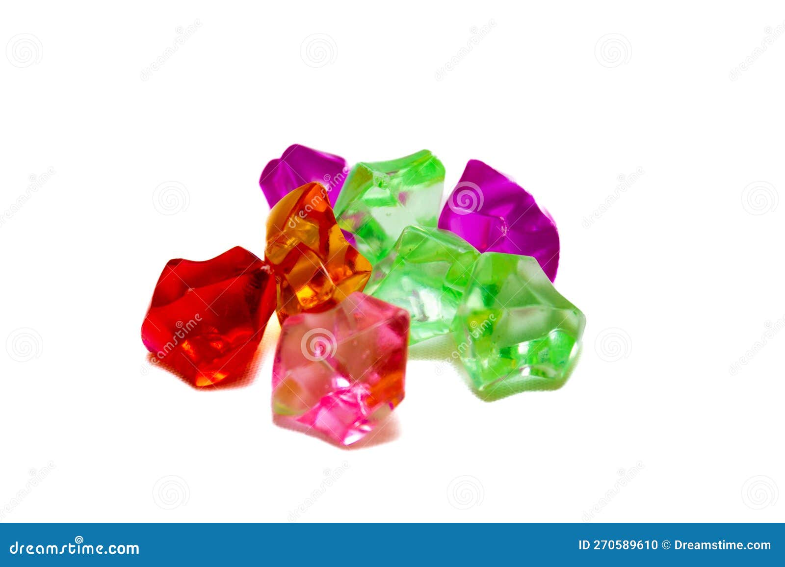 Beautiful Plastic Gems of Different Colors on a White Isolated ...