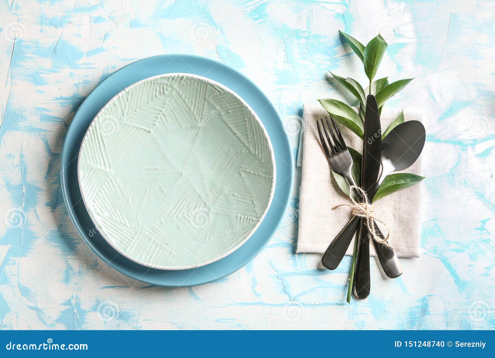 Beautiful Plates and Flatware on Color Table Stock Photo - Image of ...