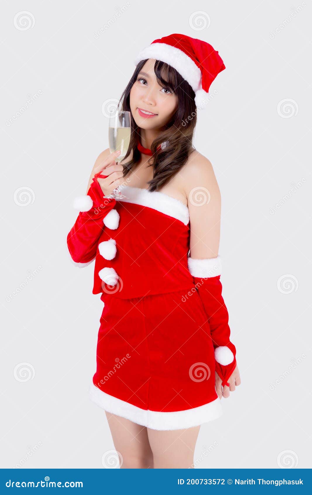 Beautiful Portrait Young Asian Woman In Santa Holding Glass Of