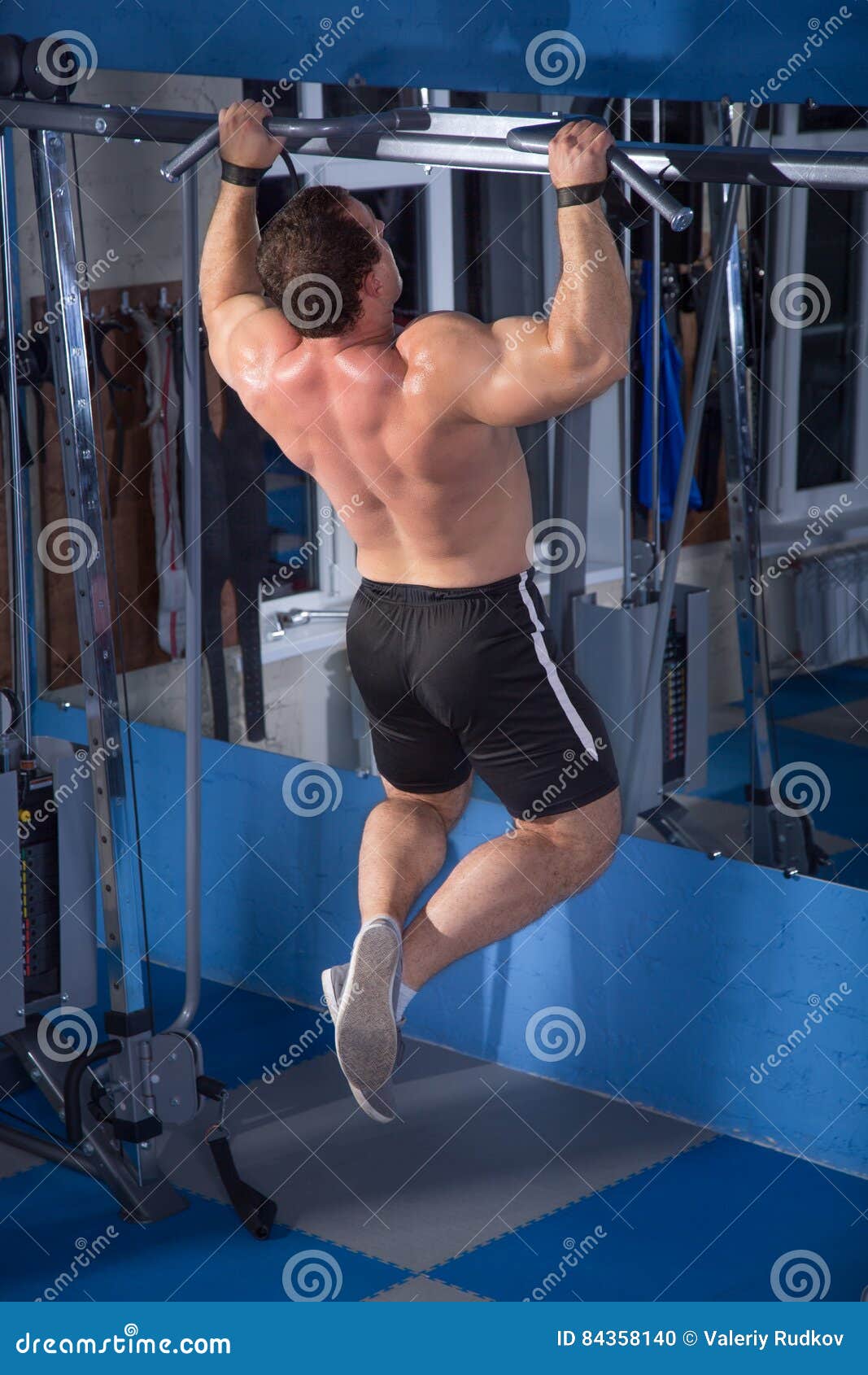 Beautiful, Powerful, Strong Man Posing at the Gym Stock Photo - Image ...