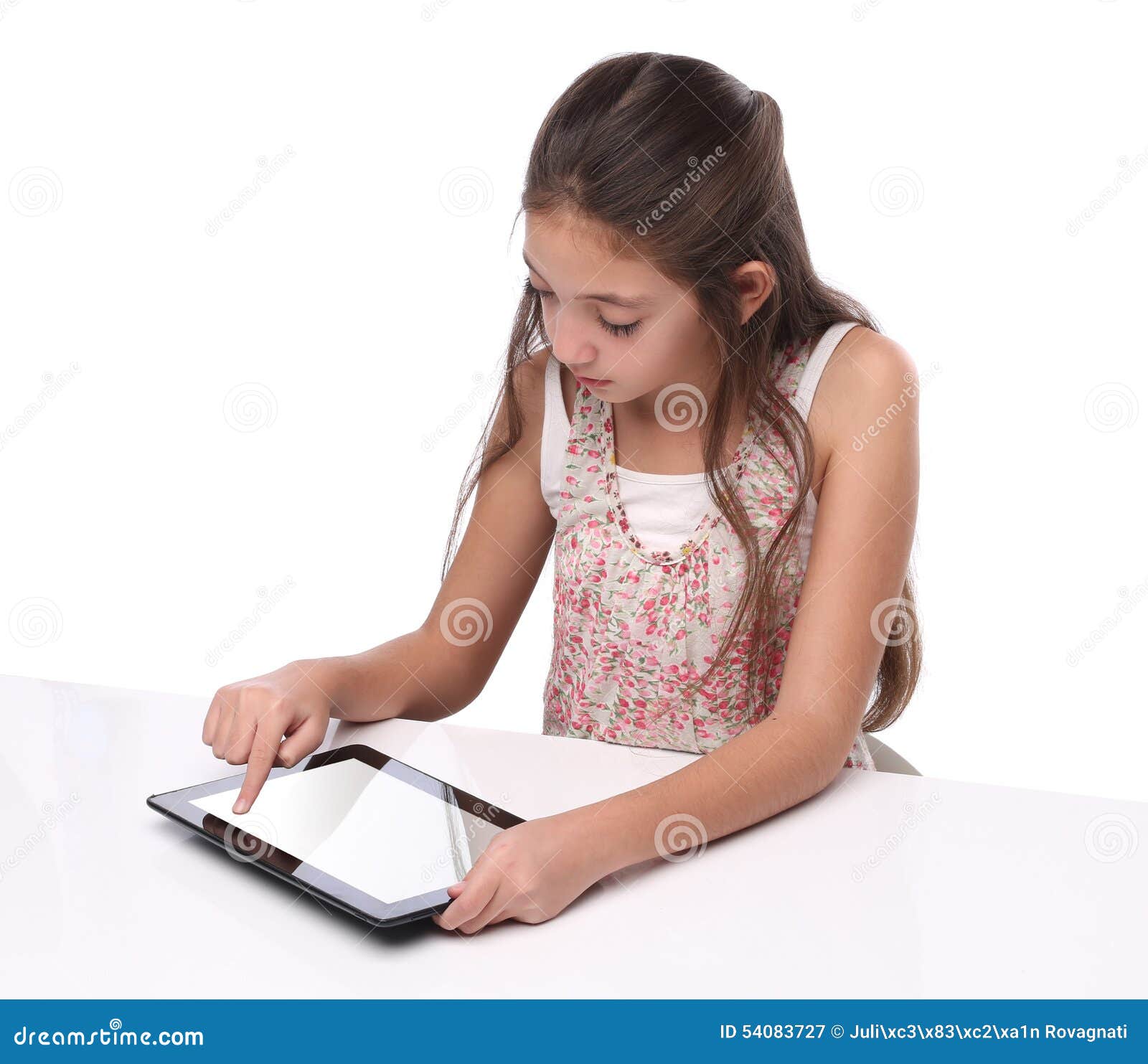 Beautiful Pre-teen Girl Using a Tablet Computer. Stock Image - Image of ...