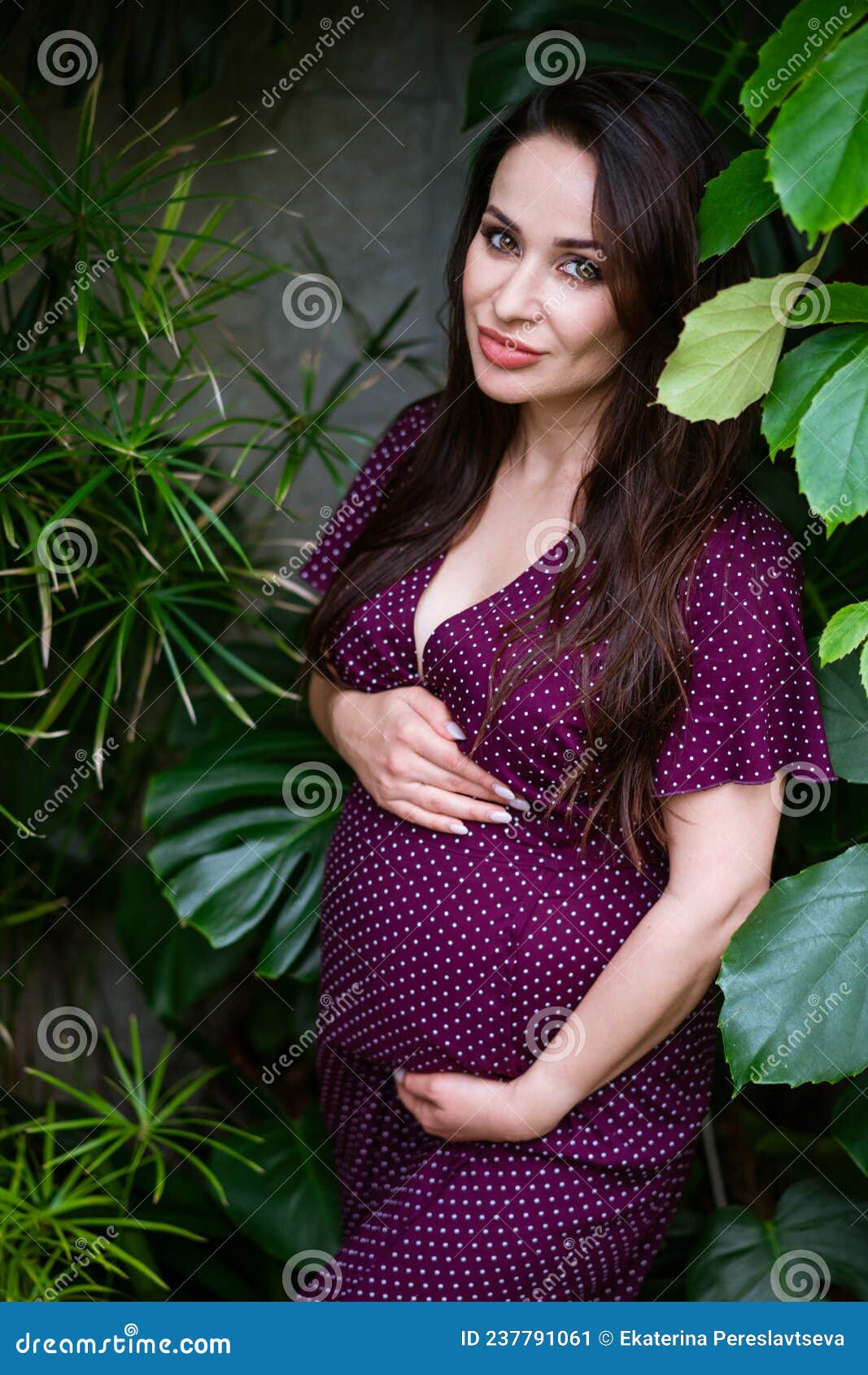 Beautiful Pregnant Woman Feels Great In Beautiful Dress With Long