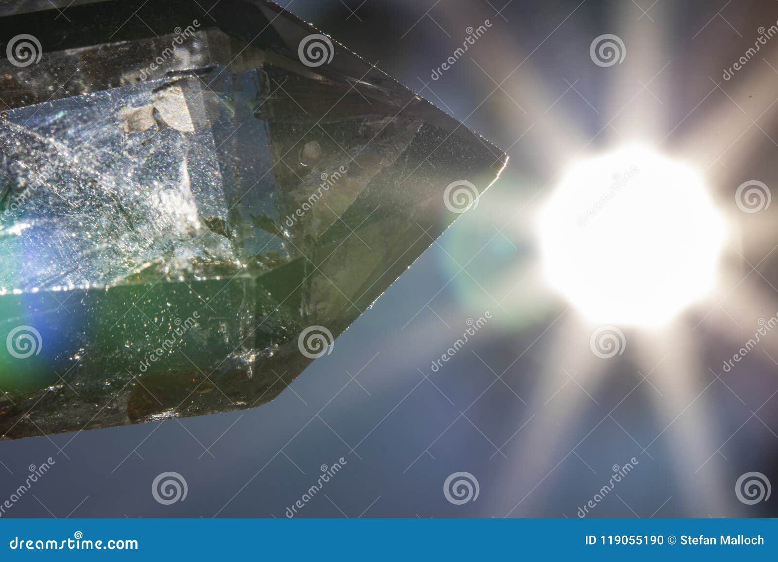 Beautiful Quartz Crystal Close Up With The Bright Sun In The Background ...