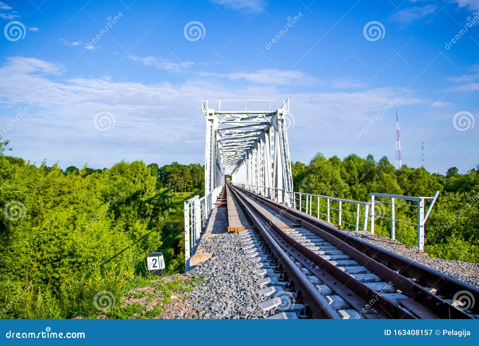 Beautiful Railway Bridge on a Background of Greenery and Blue Sky ...