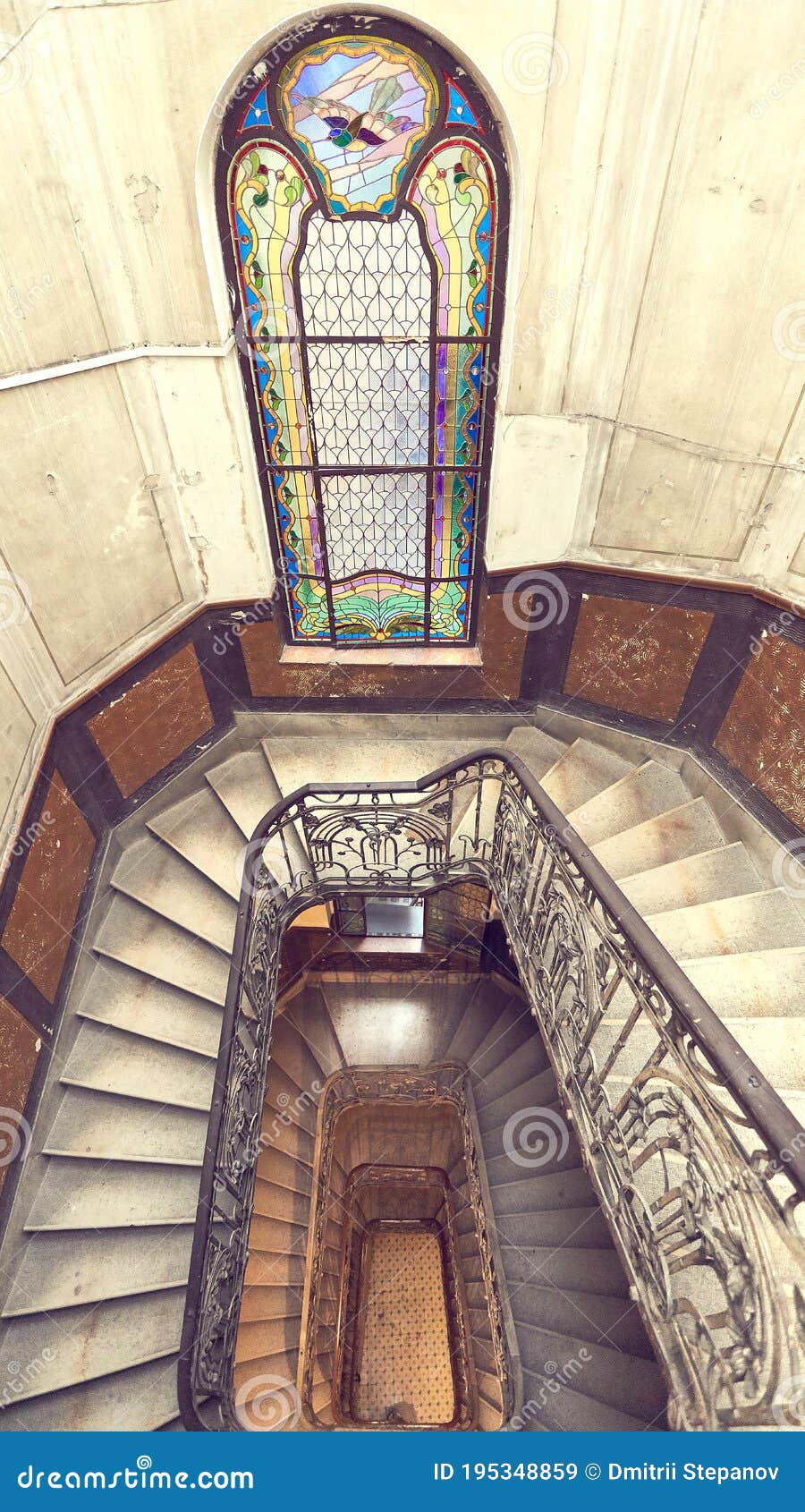 Beautiful Rectangular Spiral Staircase with Black Railings and Amazing ...