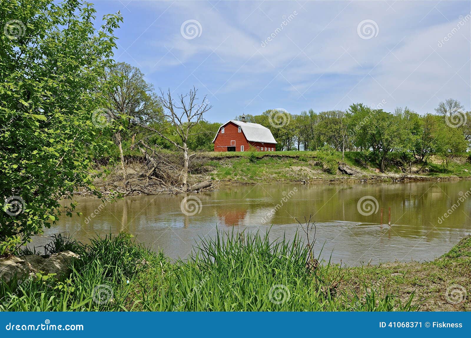 Beautiful Red Barn on the Eroding Banks of a River Stock Image - Image ...