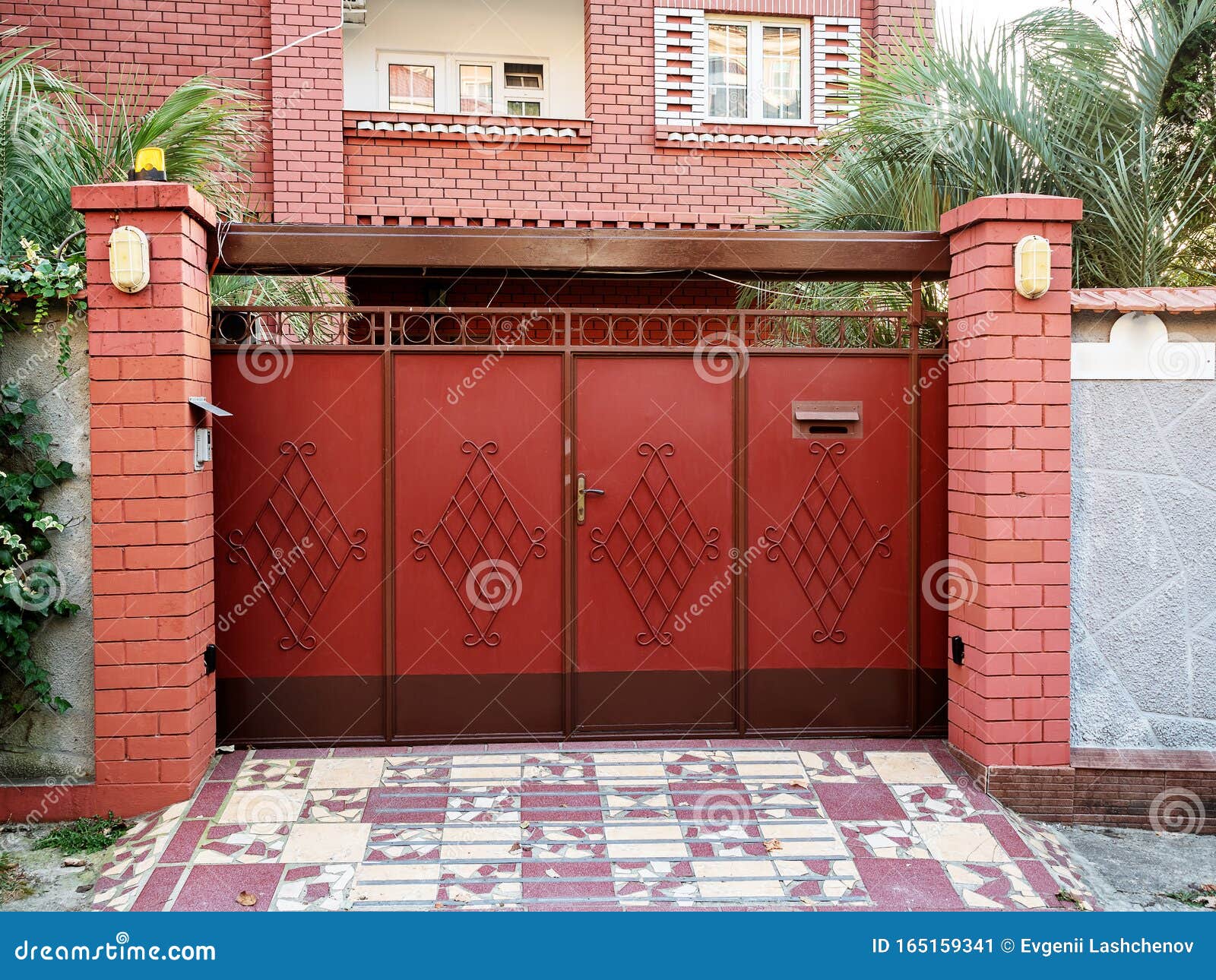 Beautiful Red Gates with Forging Elements on the Background of the ...