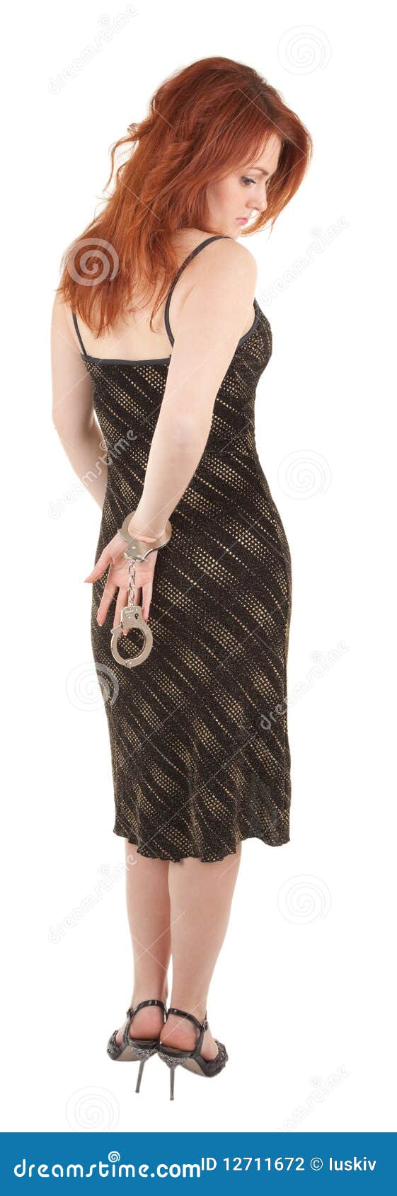 Beautiful Red-haired Girl in Handcuffs Stock Photo - Image of ...