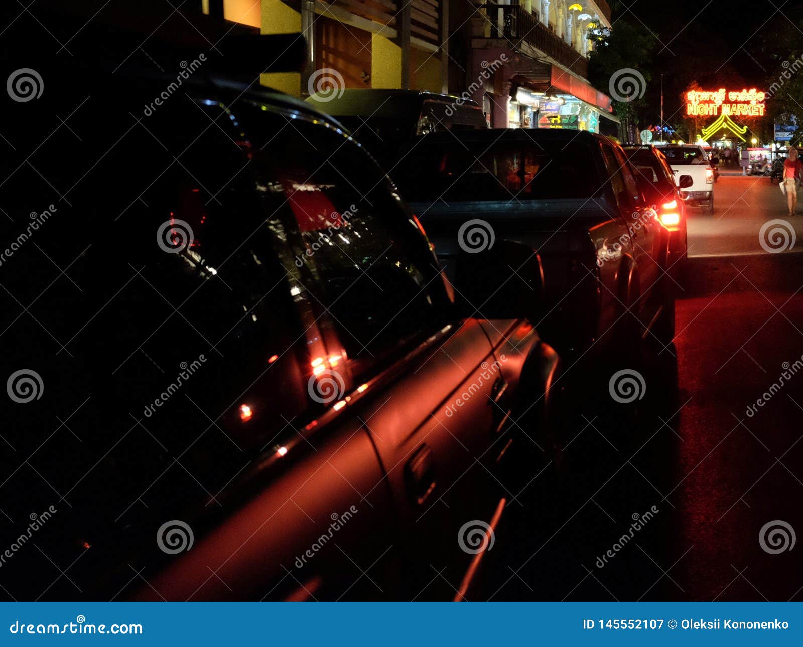 Beautiful Red Light from the Car`s Rear Lights Reflects Off the Surface ...