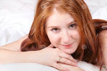 Beautiful redhead in bed stock photo. Image of beauty - 23558970