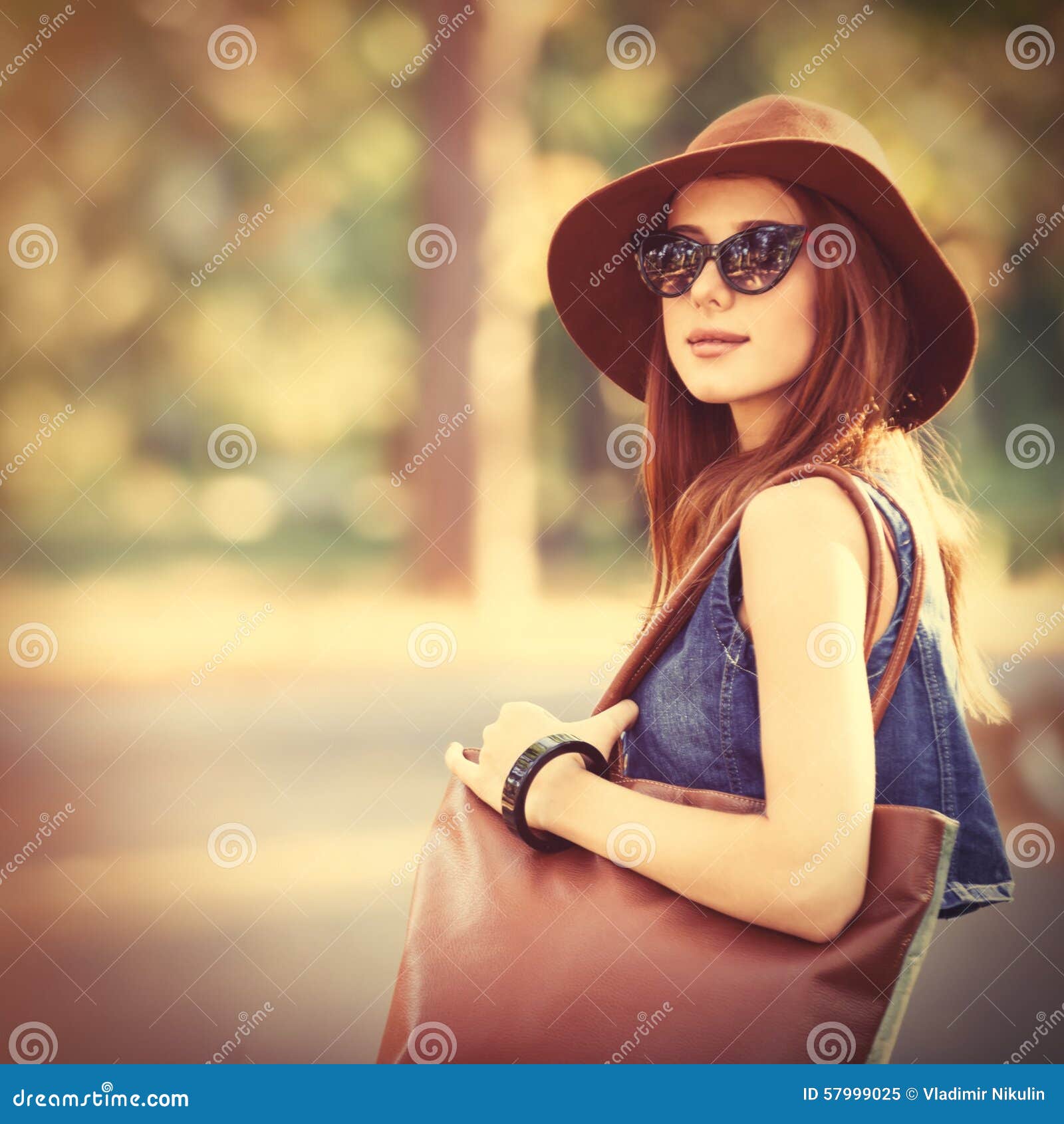 Beautiful Redhead Girl with Bag in the Park. Stock Image - Image of ...